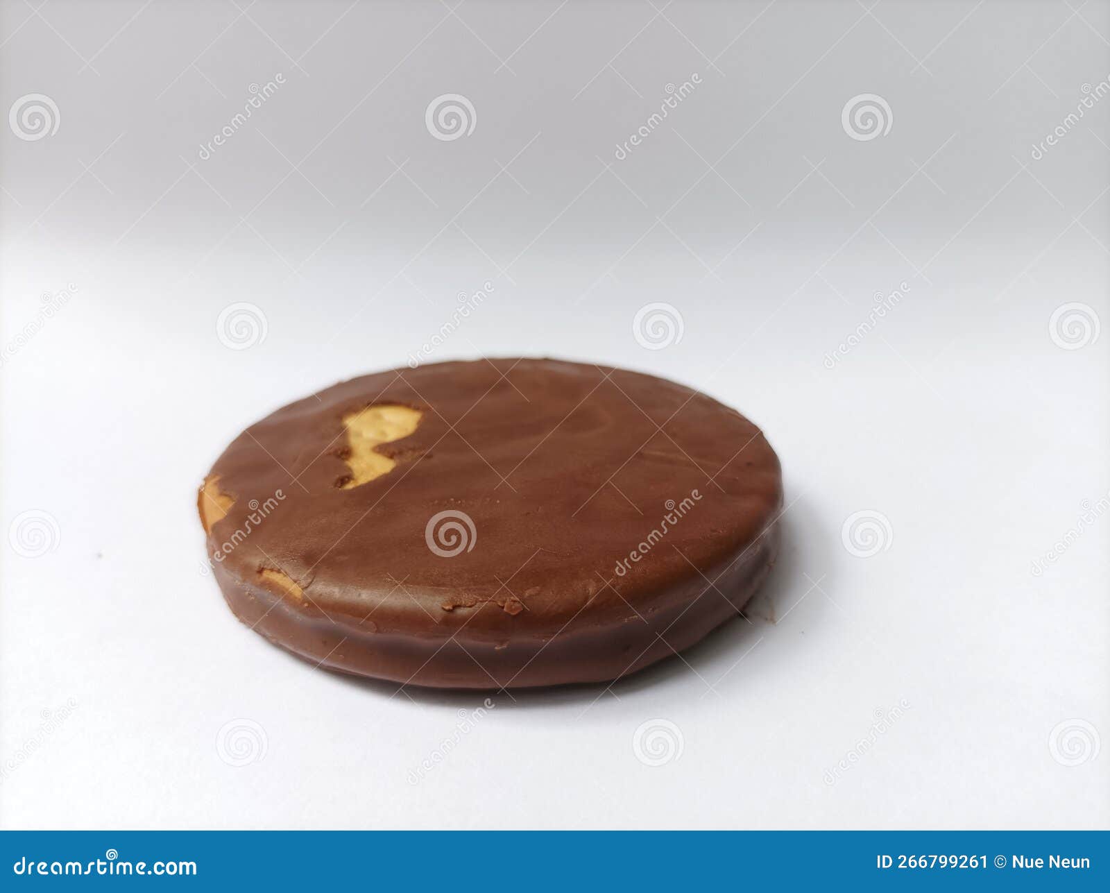 A Round Cake Wrapped in Chocolate with Cream Inside. Stock Image ...