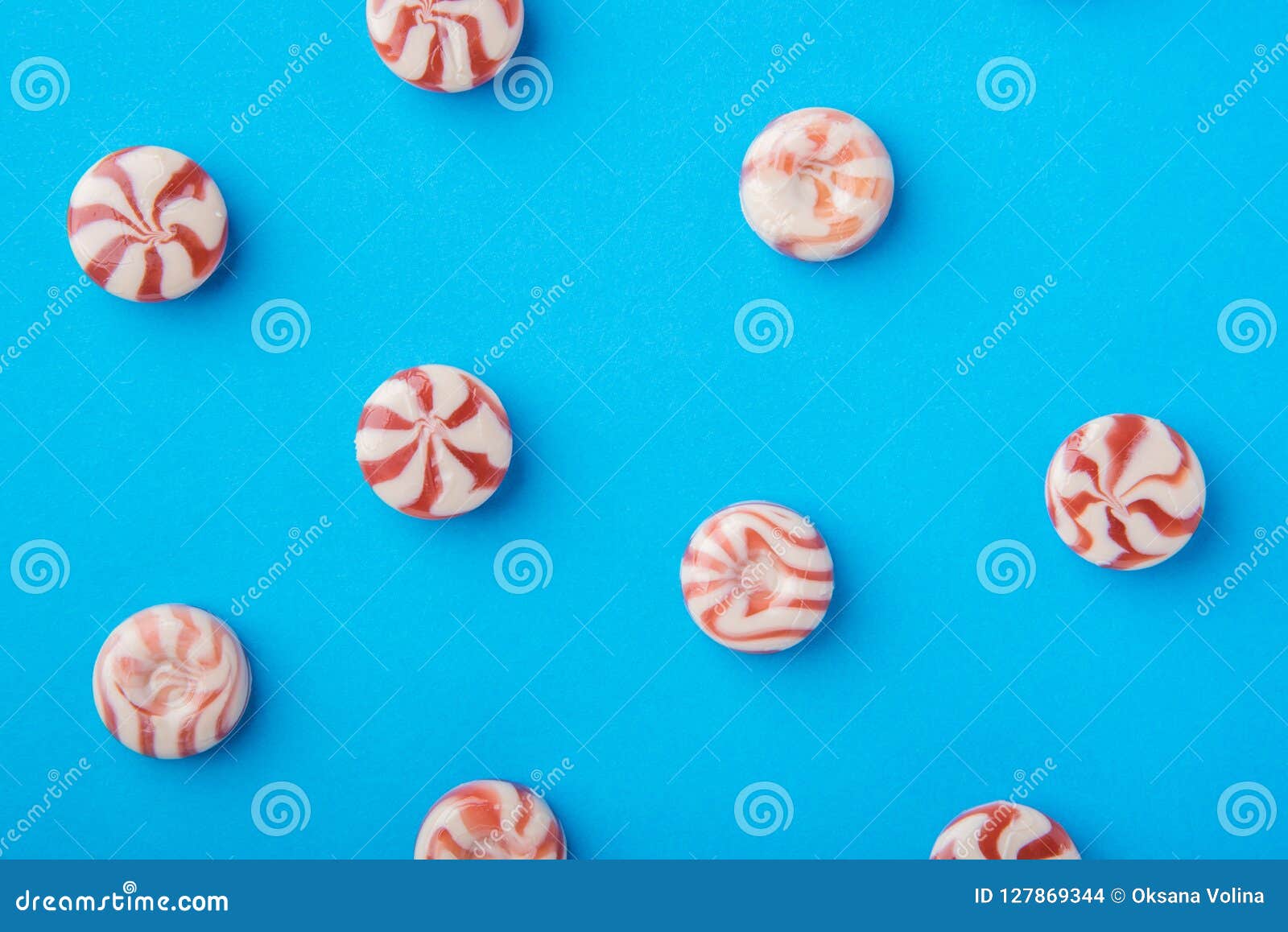 Round Candy Red and White on a Blue Background Stock Photo - Image of ...