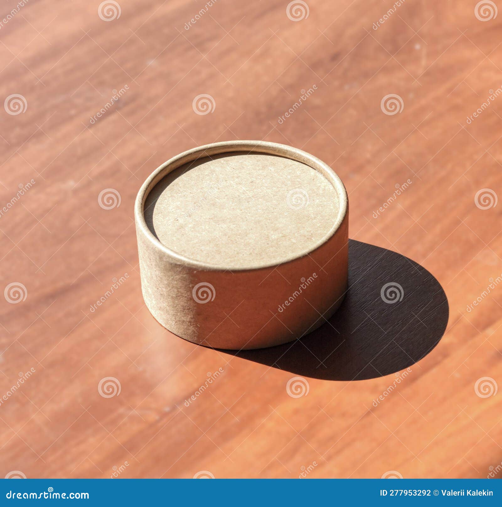 A Round Cardboard Box on the Table. Sunny Morning Stock Photo - Image ...