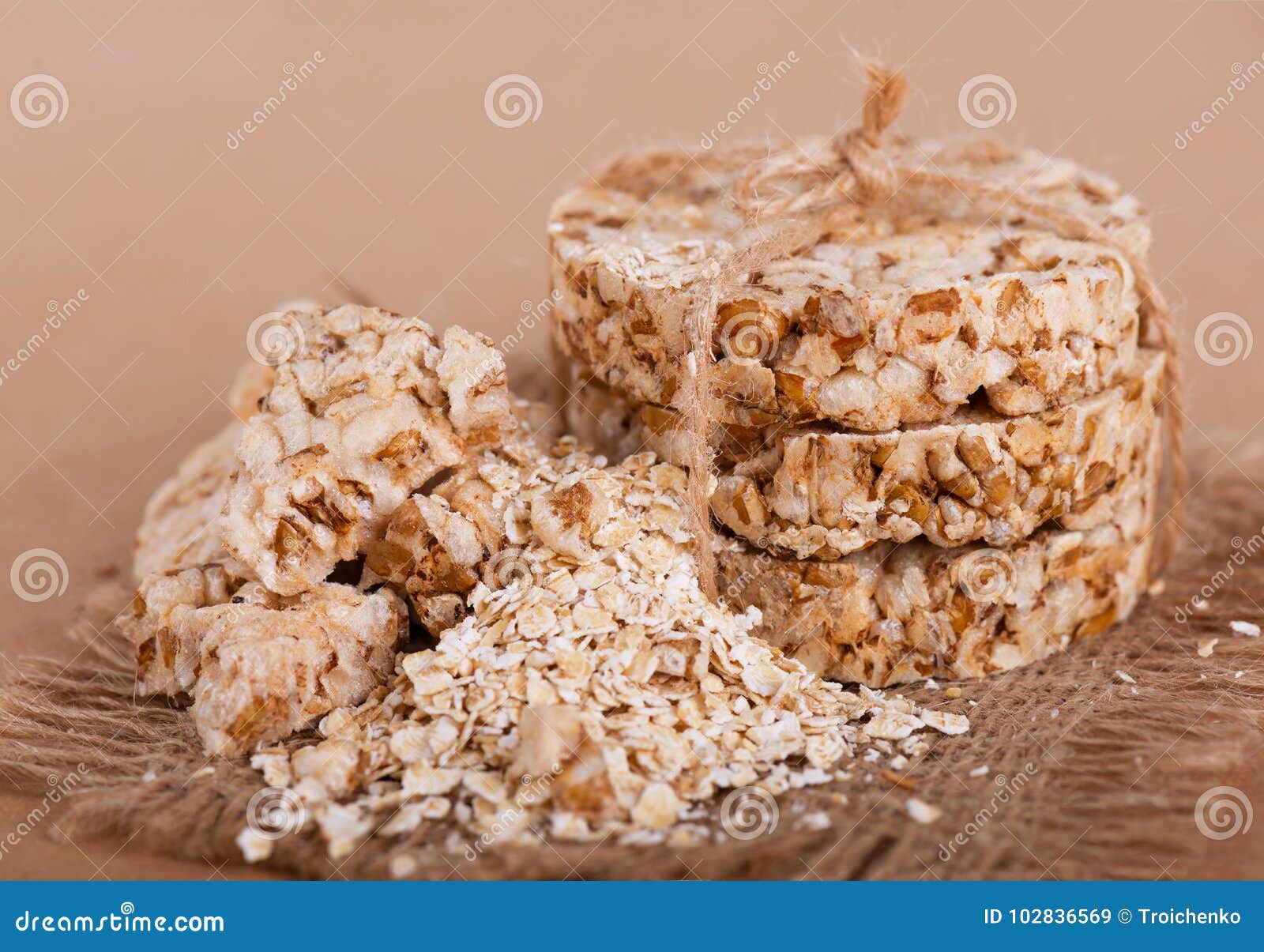 Round Cereal Crispbread Tied with Rope, Crumbs on Surface. Rustic Style ...