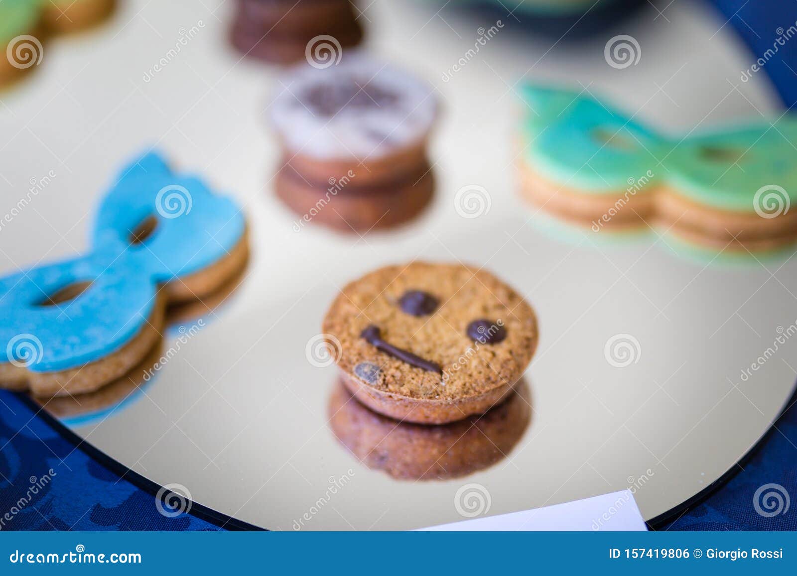 Round Chocolate Biscuit in the Shape of a Face with Smile Stock Photo ...