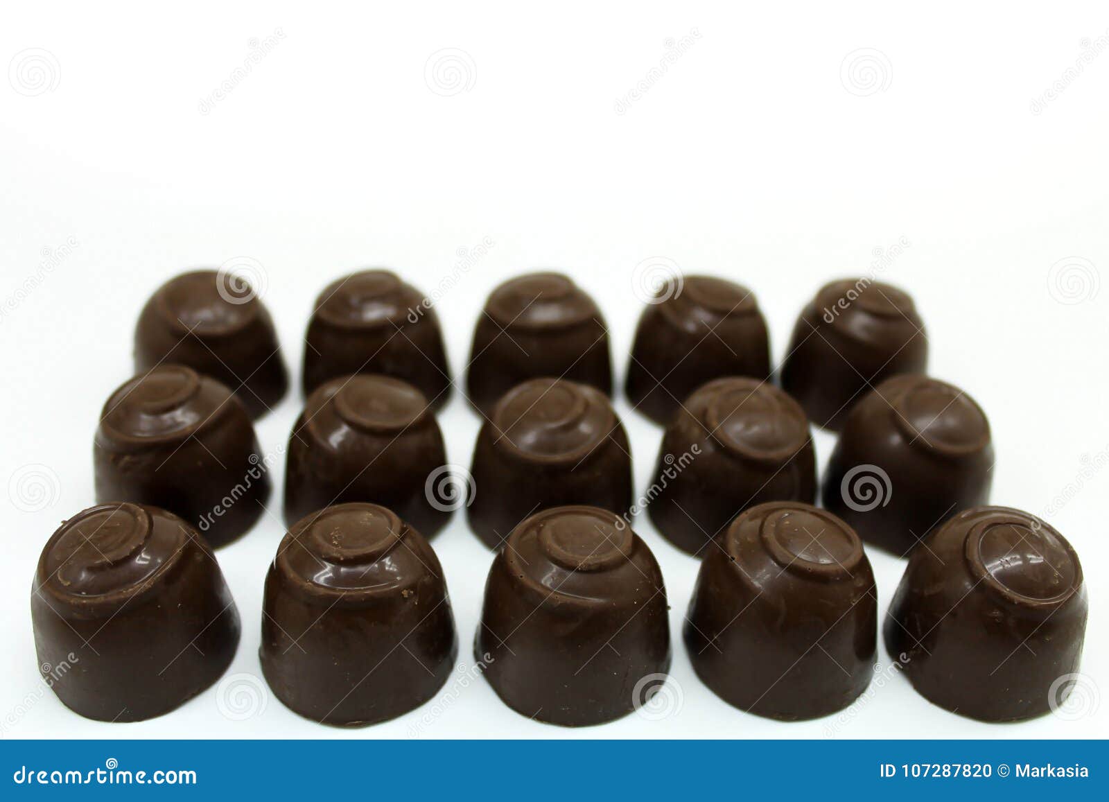 Round Chocolate Candy Isolated on White Stock Photo - Image of pattern ...