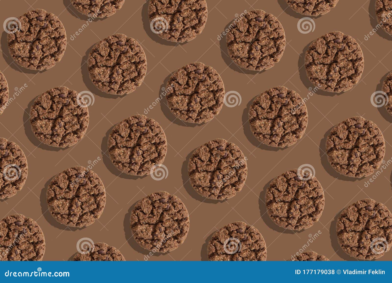 Round Chocolate Chip Patterns with Hard Shadows on a Brown Background ...