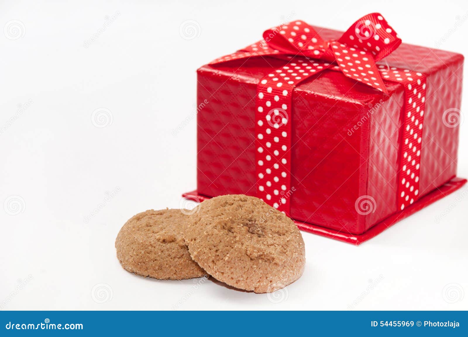 Round Chocolate Cookie and Red Gift Box with Bow Stock Image - Image of ...