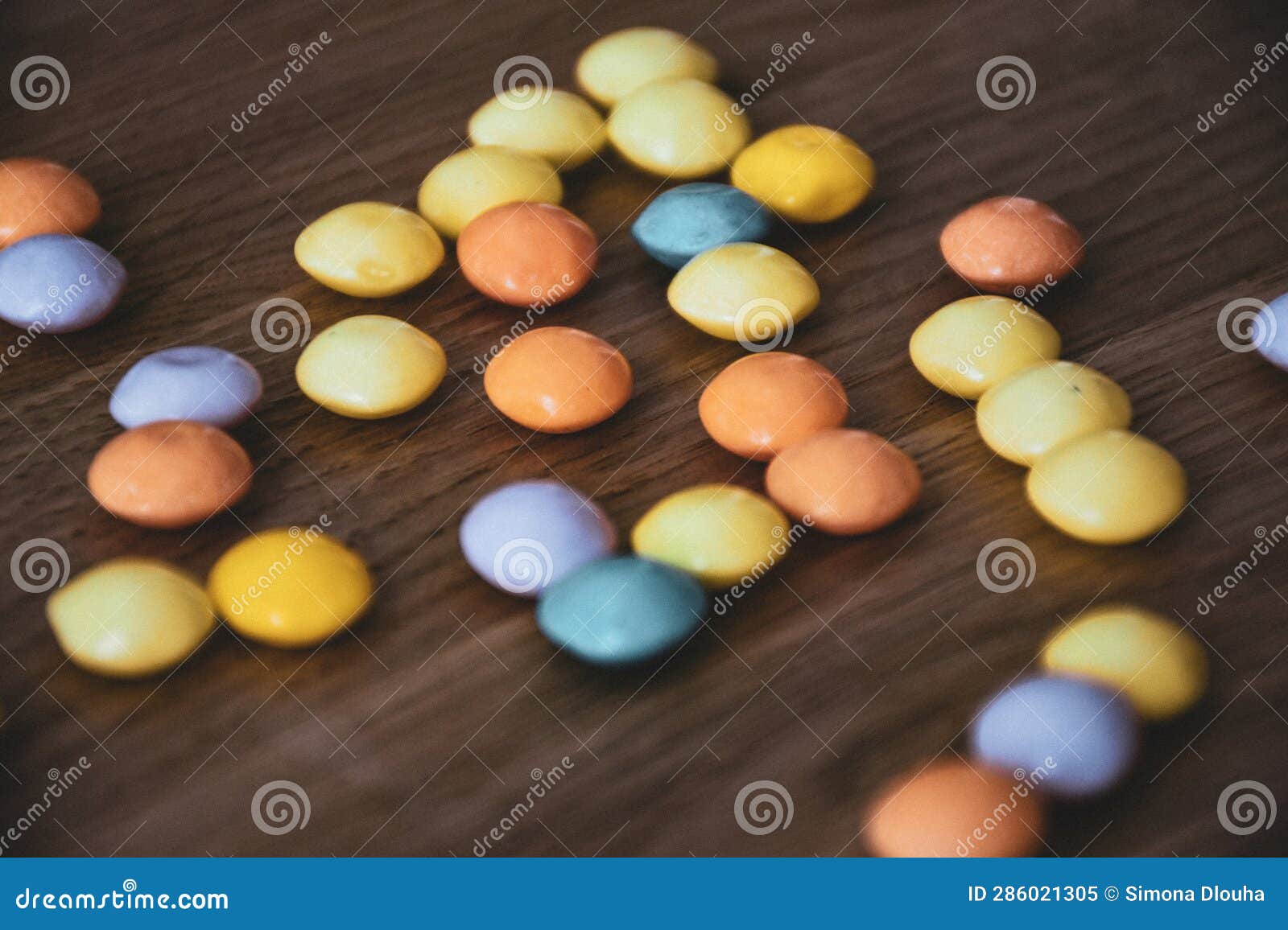Round Colored Lentils with Chocolate on the Table Stock Image - Image ...