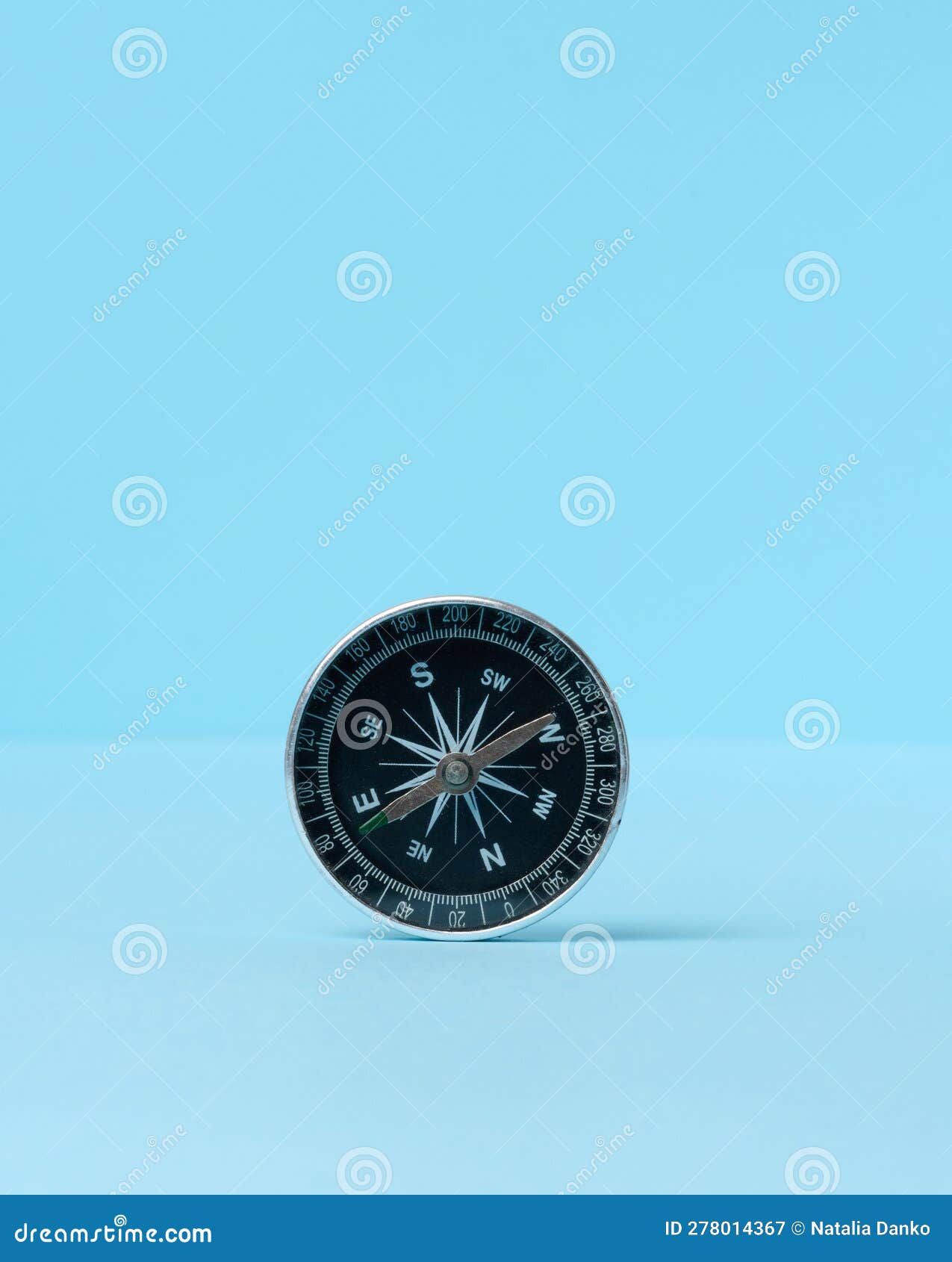 Round Compass on a Blue Background Stock Image - Image of device, metal ...