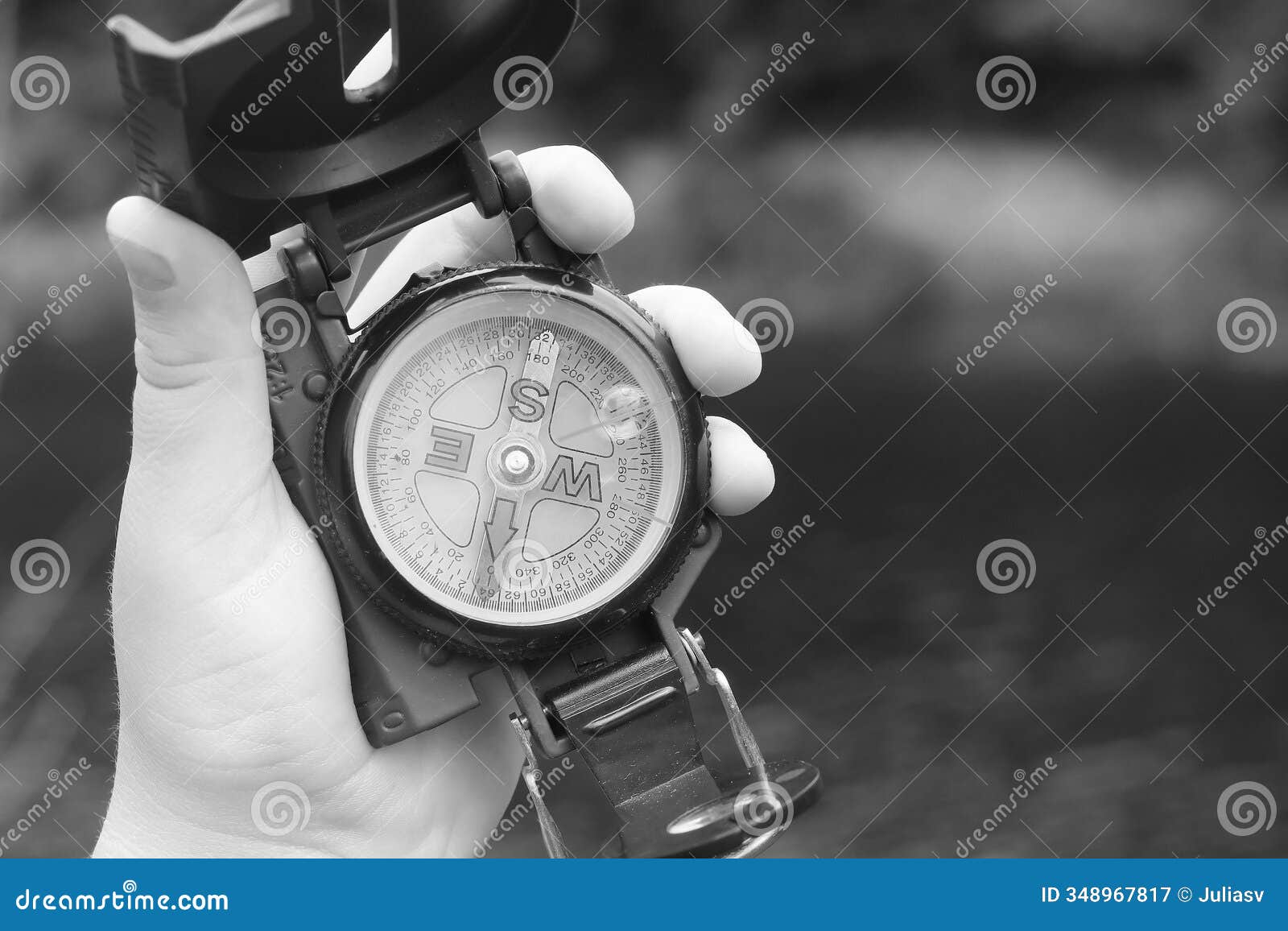 Round Compass in Hand on Abstract Background Stock Image - Image of ...