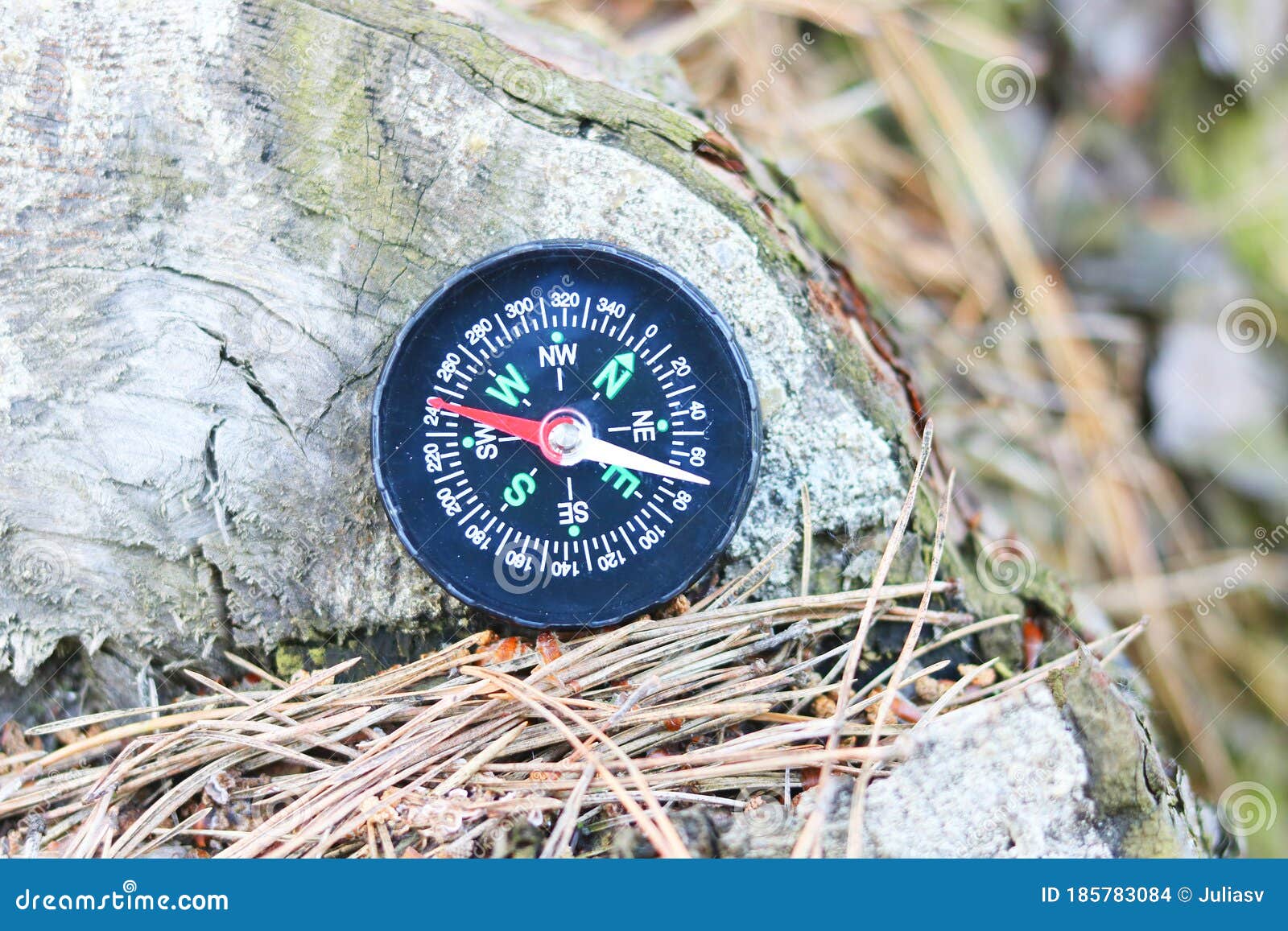 Round Compass on Natural Background Stock Photo - Image of discovery ...