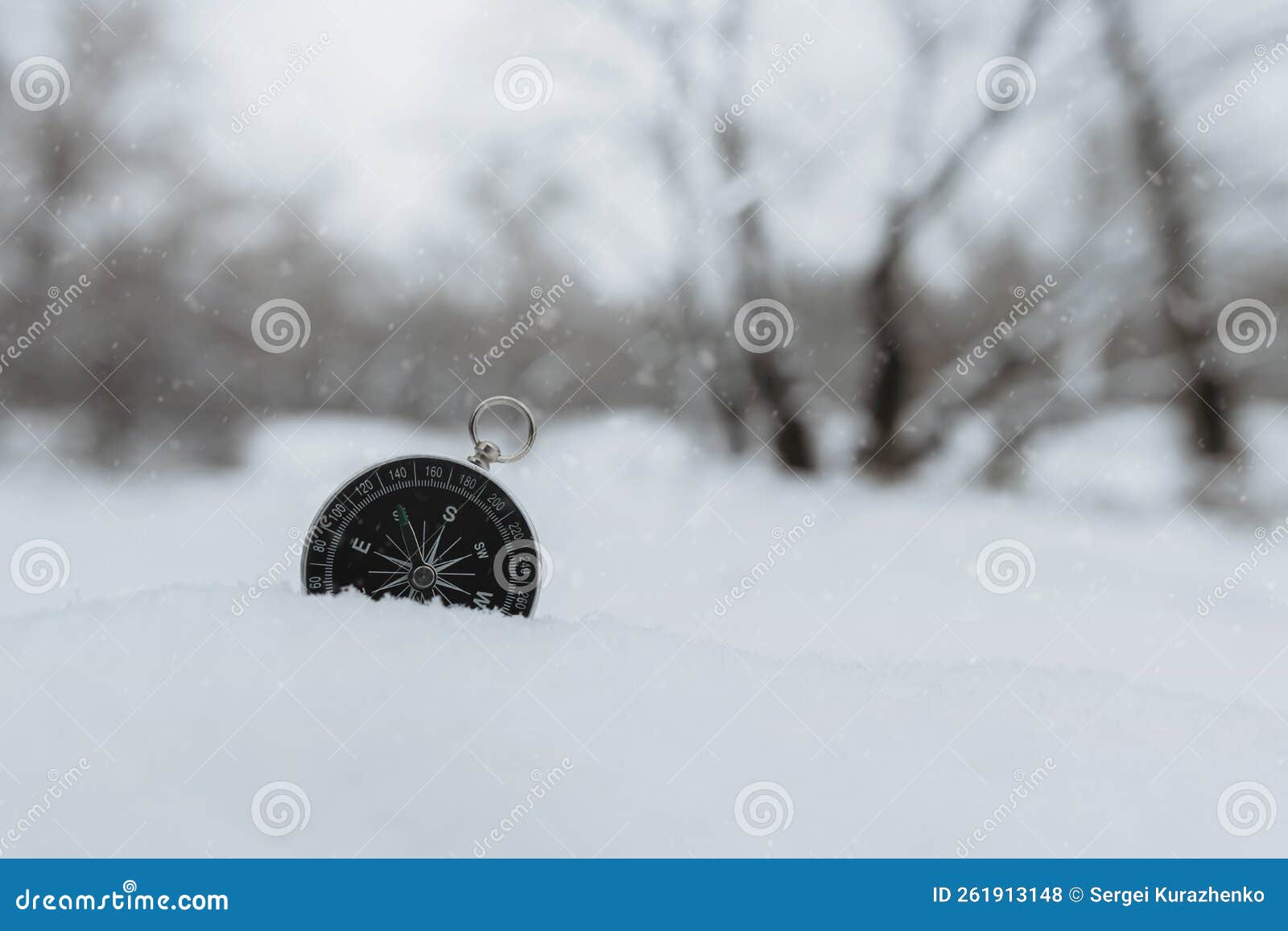 Round Compass in the Snow, Space for Text. Navigation in the Winter ...