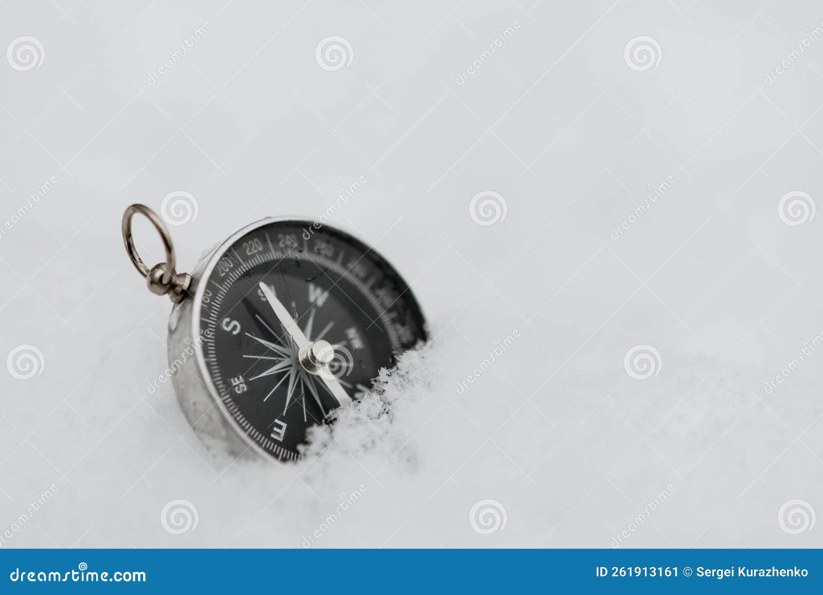 Round Compass in the Snow, Space for Text. Navigation in the Winter ...