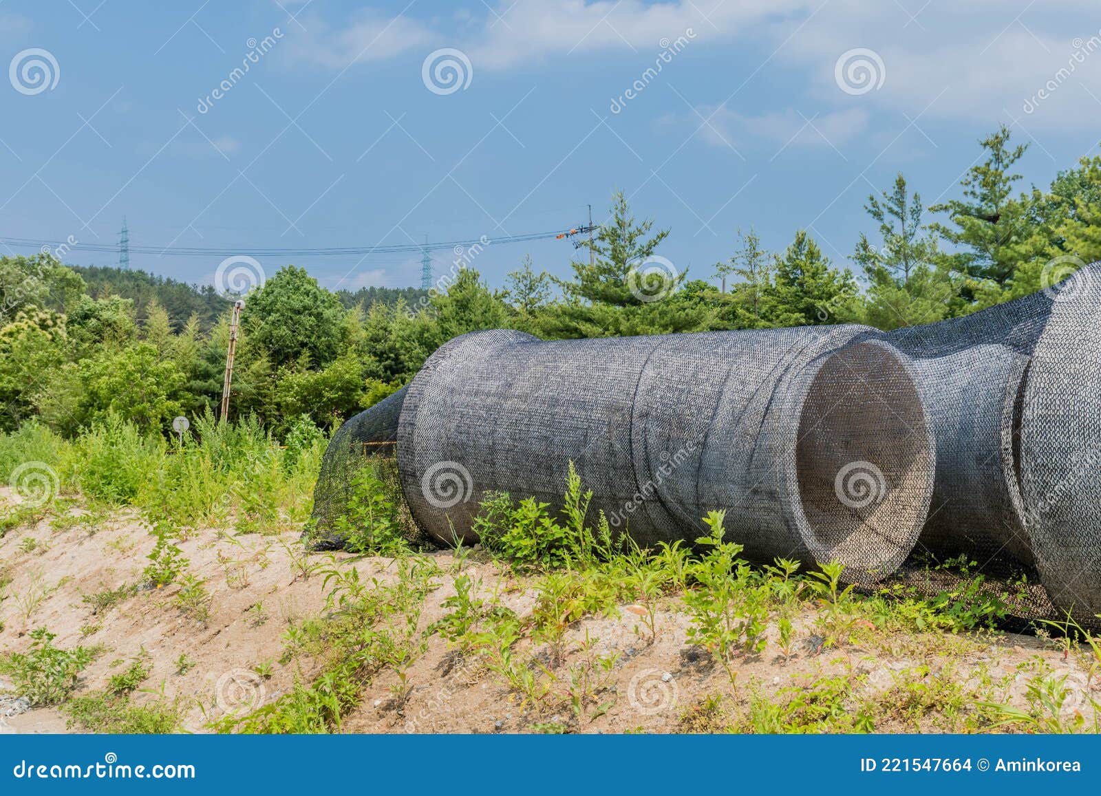 Round Culvert Sections Covered with Black Mesh Stock Photo - Image of ...