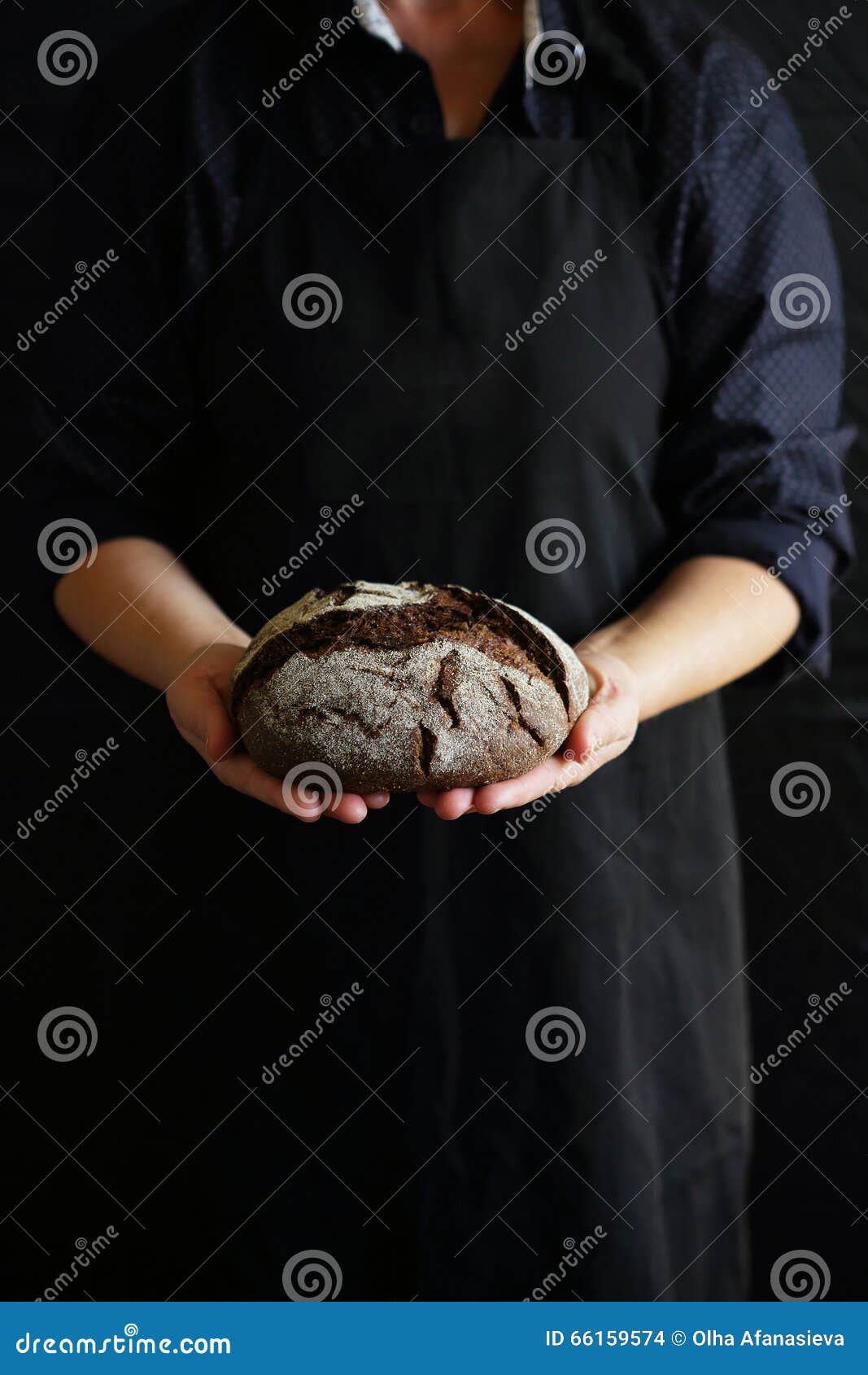 Round Dark Bread in Woman Hands Stock Photo - Image of fresh, hold ...