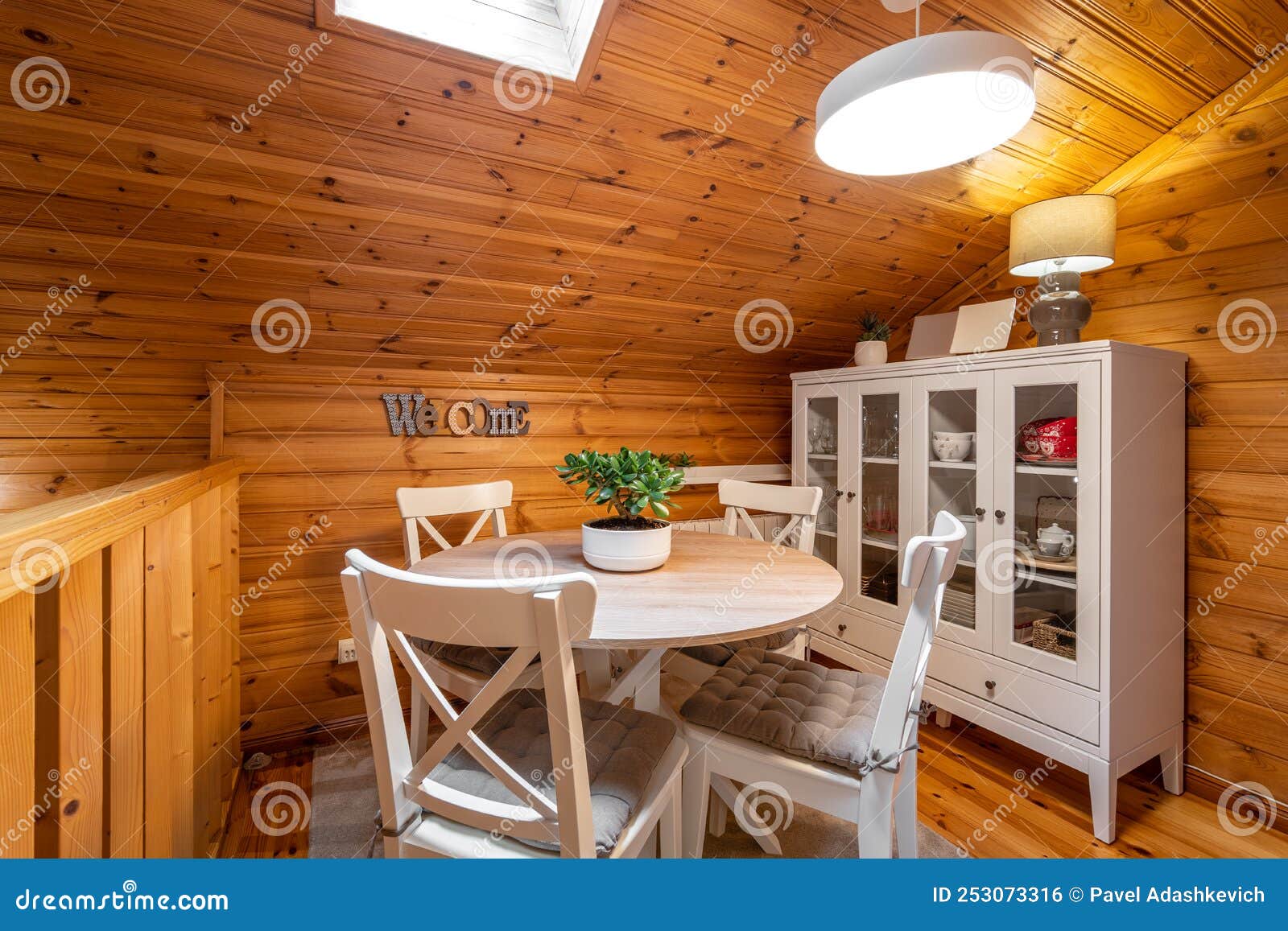 Round Dining Table with Chairs and Cupboard in Completely Wooden House ...