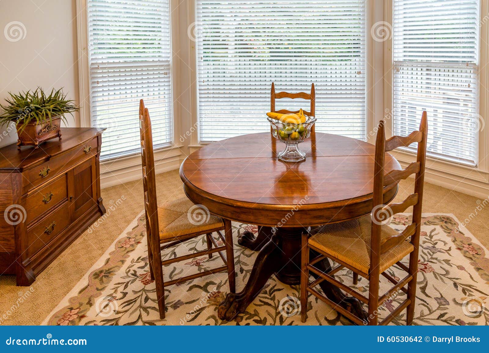 Round Dining Table in a Sunny Room Stock Photo - Image of window ...
