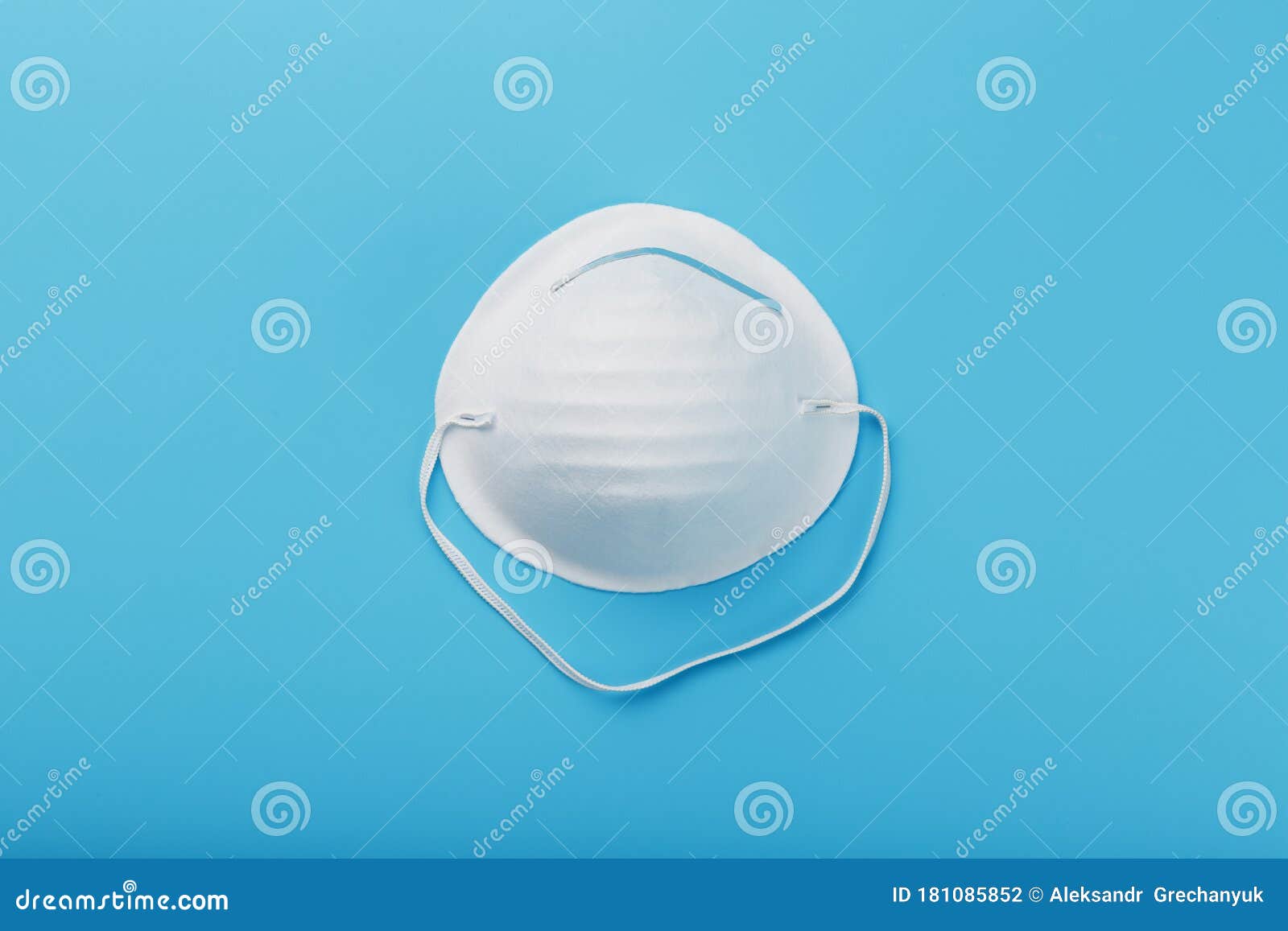Round Face Mask on a Blue Background. Virus Protection Isolate Stock ...