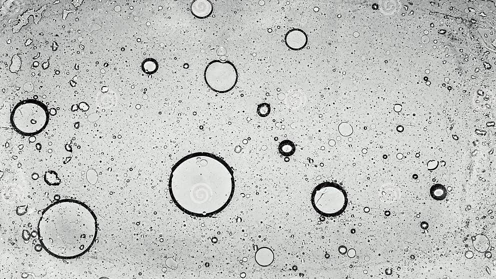 Round Fat Bubbles Float on the Water Surface Stock Image - Image of ...