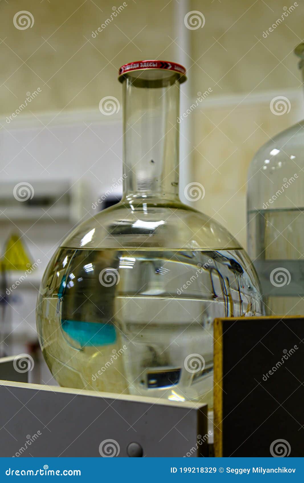A Round Flask with a Clear Liquid is in the Laboratory Stock Image ...