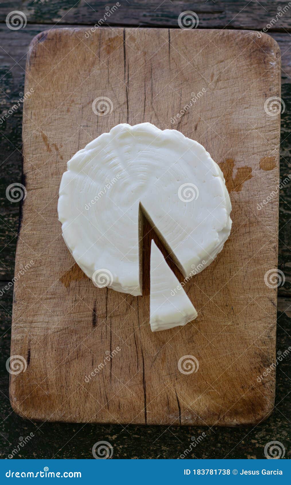 Round Fresh Cheese with a Cut Portion. Top View of a Cheese on a Wooden ...