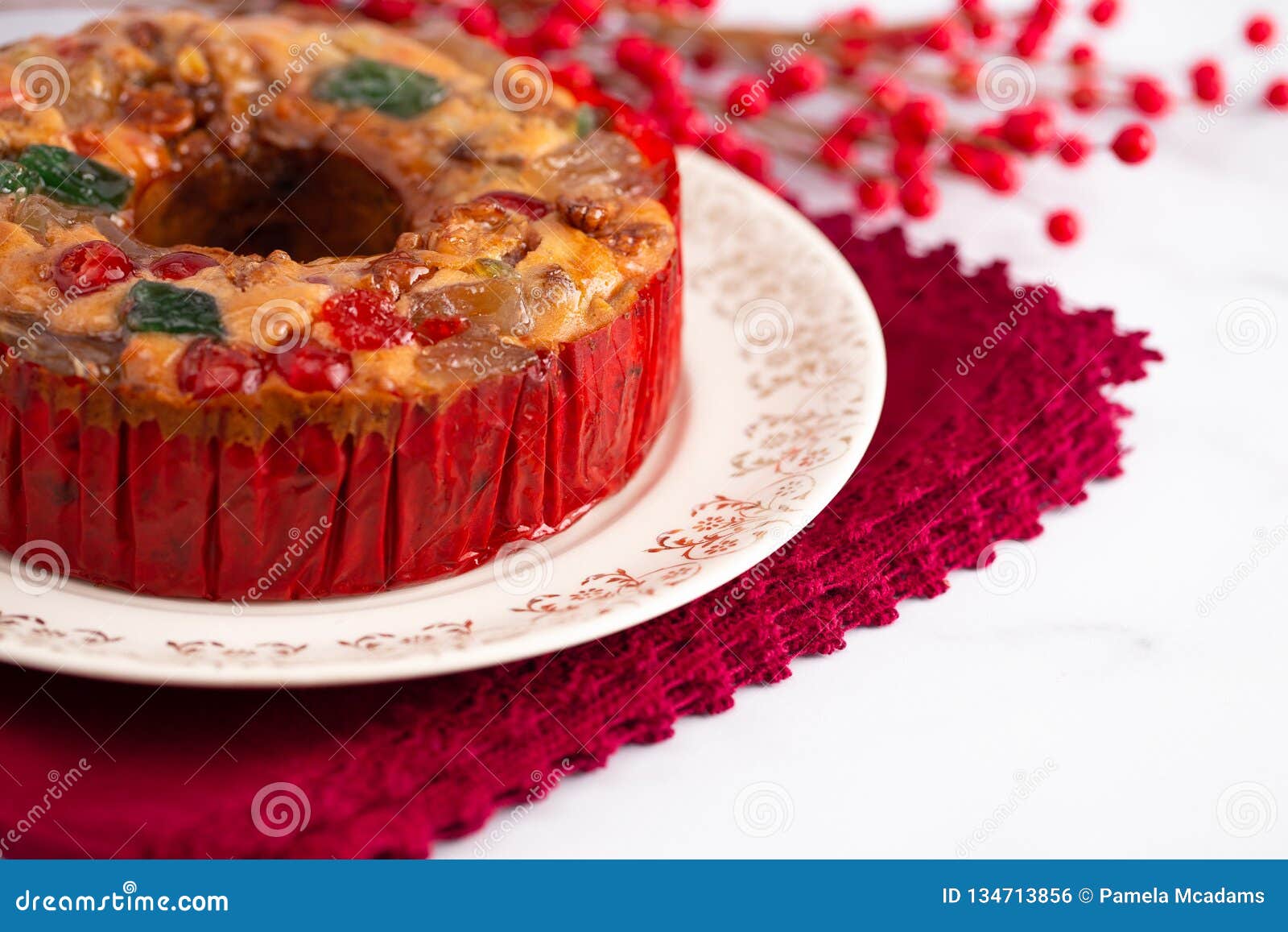 A Round Fruit Cake with Cherries Pineapples and Nuts Elegant Platter ...