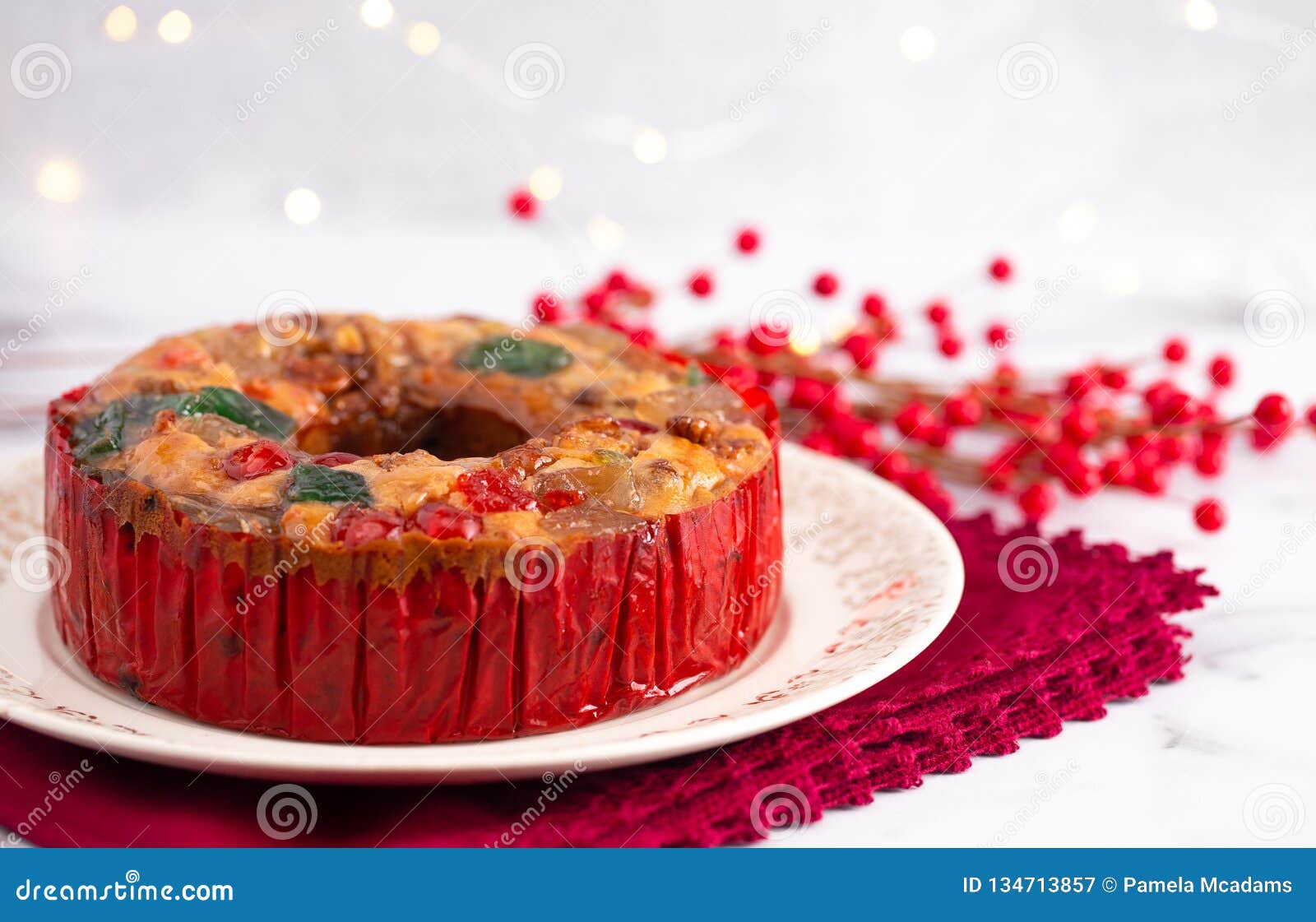A Round Fruit Cake with Cherries Pineapples and Nuts Elegant Platter ...