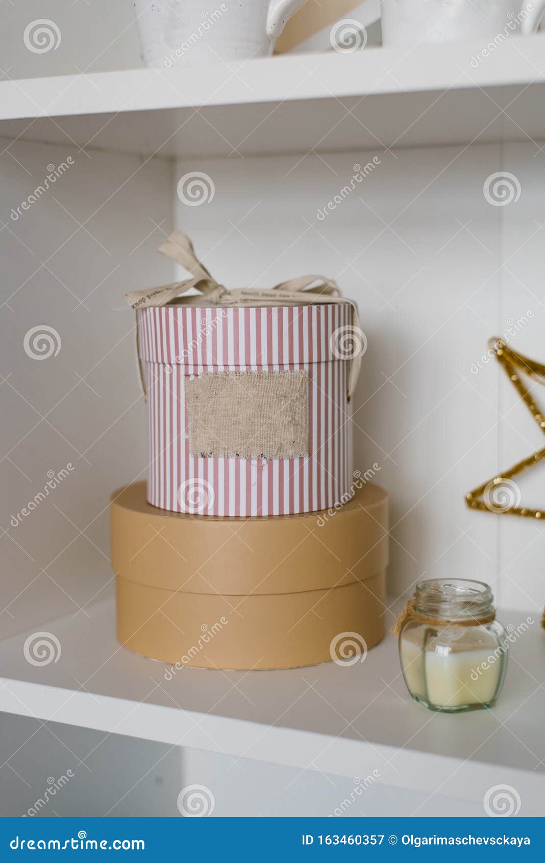 Round Gift Boxes on the Shelf Stock Image - Image of paper, round ...