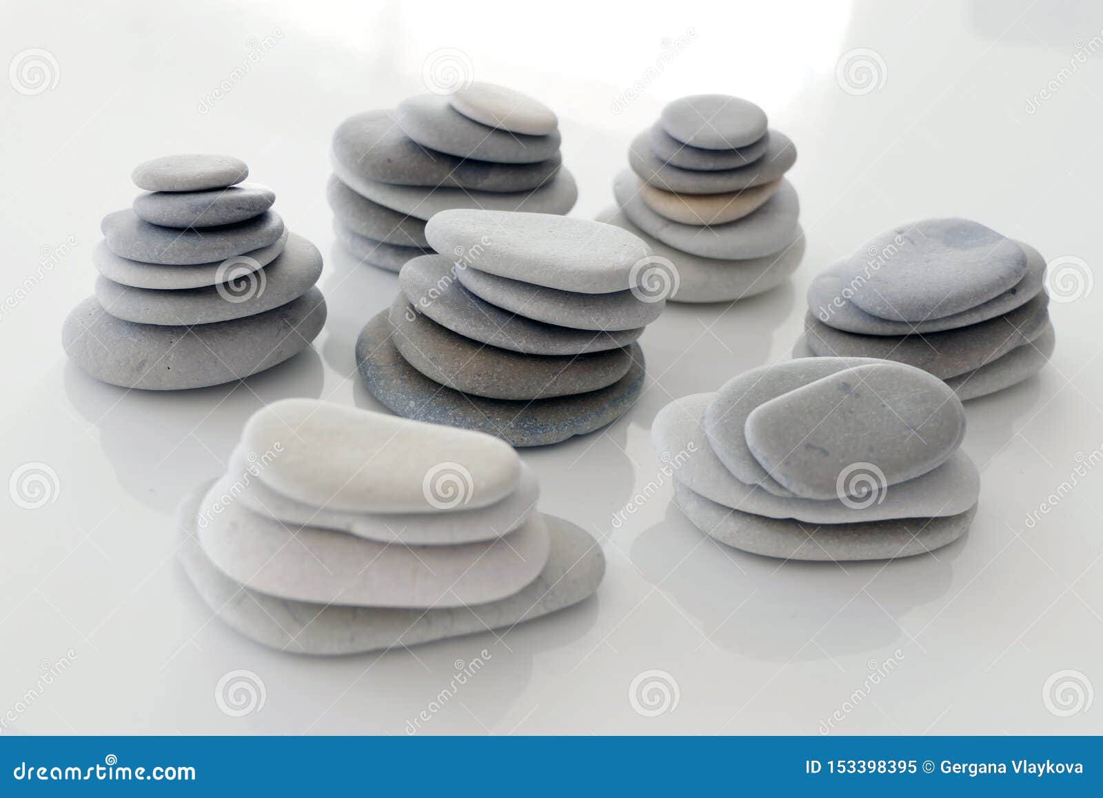 Round Gray Stones Isolated on a White Background Stock Image - Image of ...