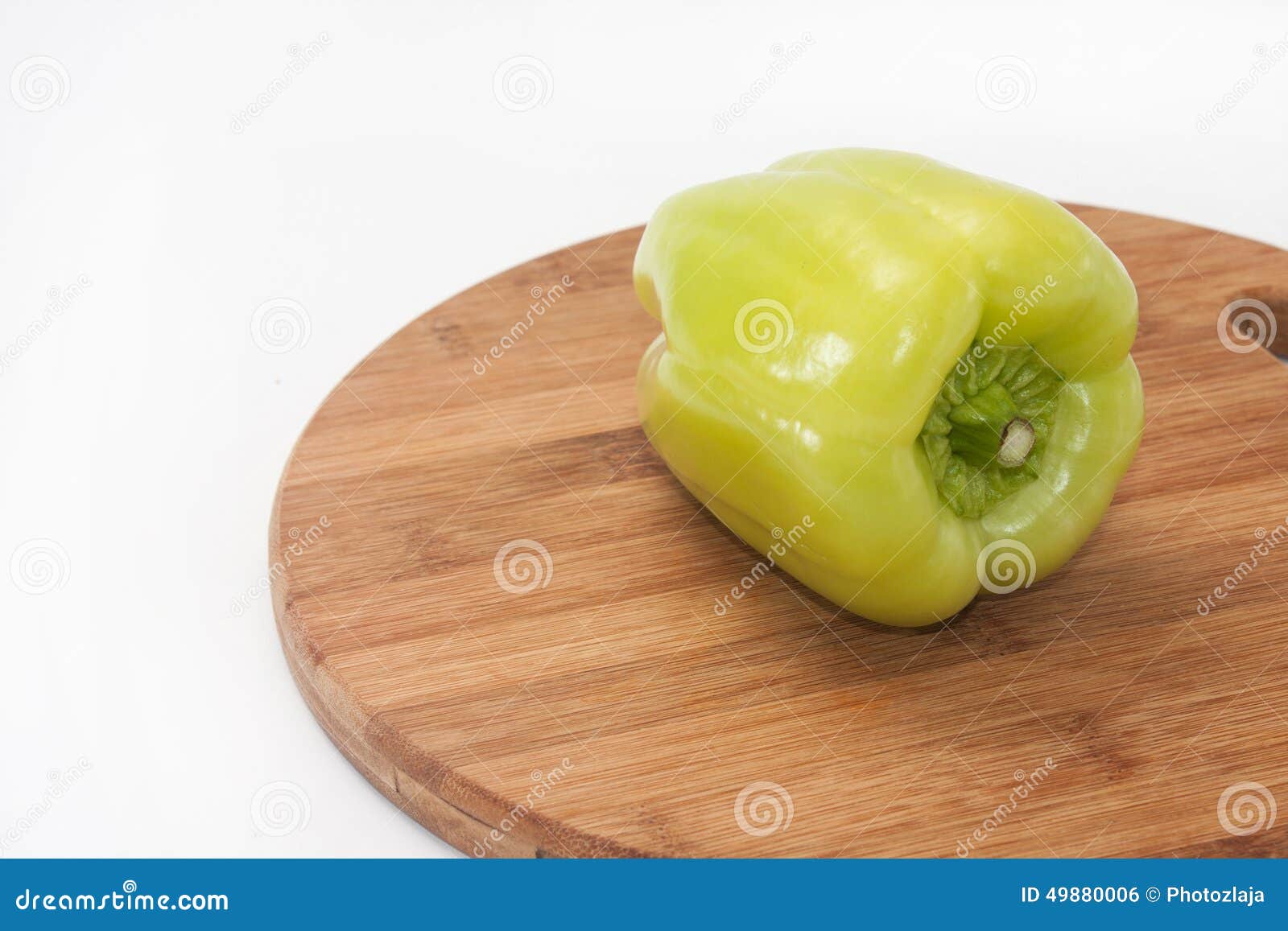Round Green Pepper on a Kitchen Board Stock Photo - Image of ...