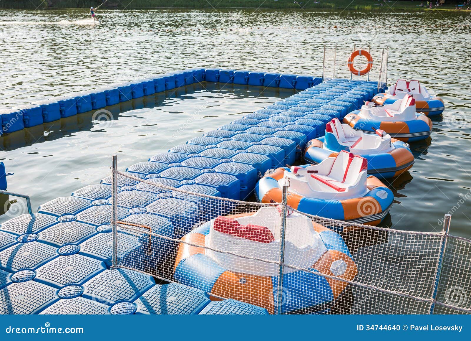 Round Inflatable Boat with Electric Motor Stock Photo - Image of orange ...