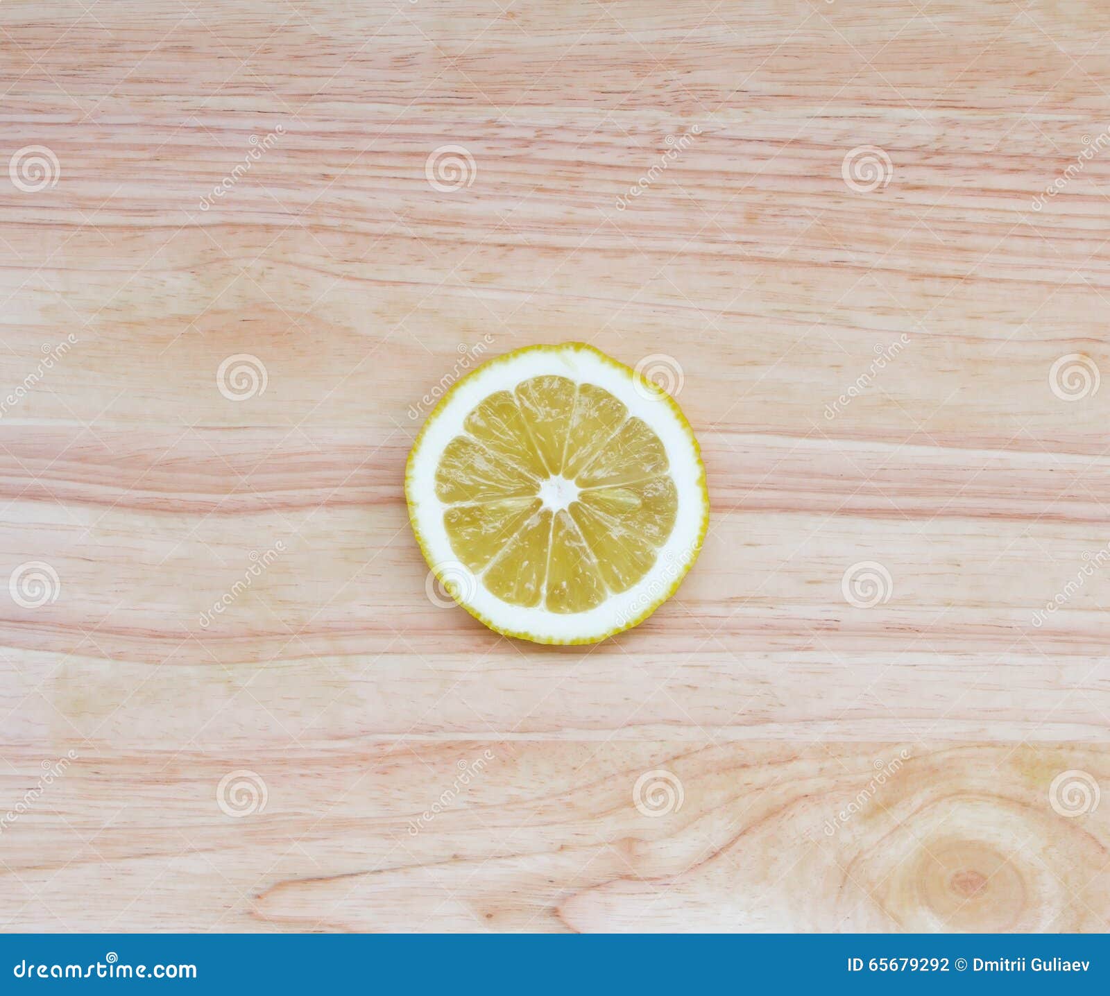A Round Lemon Slice on Wooden Table Stock Photo - Image of tropical ...