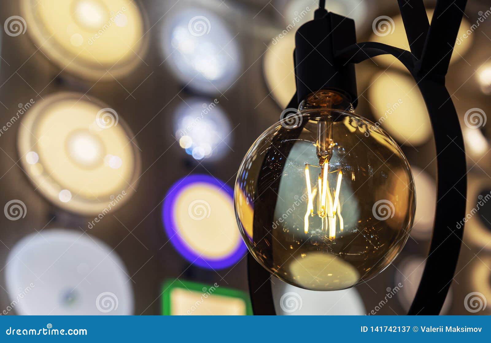 Round Light Bulb with Dark Glass in a Loft Style Stock Image - Image of ...