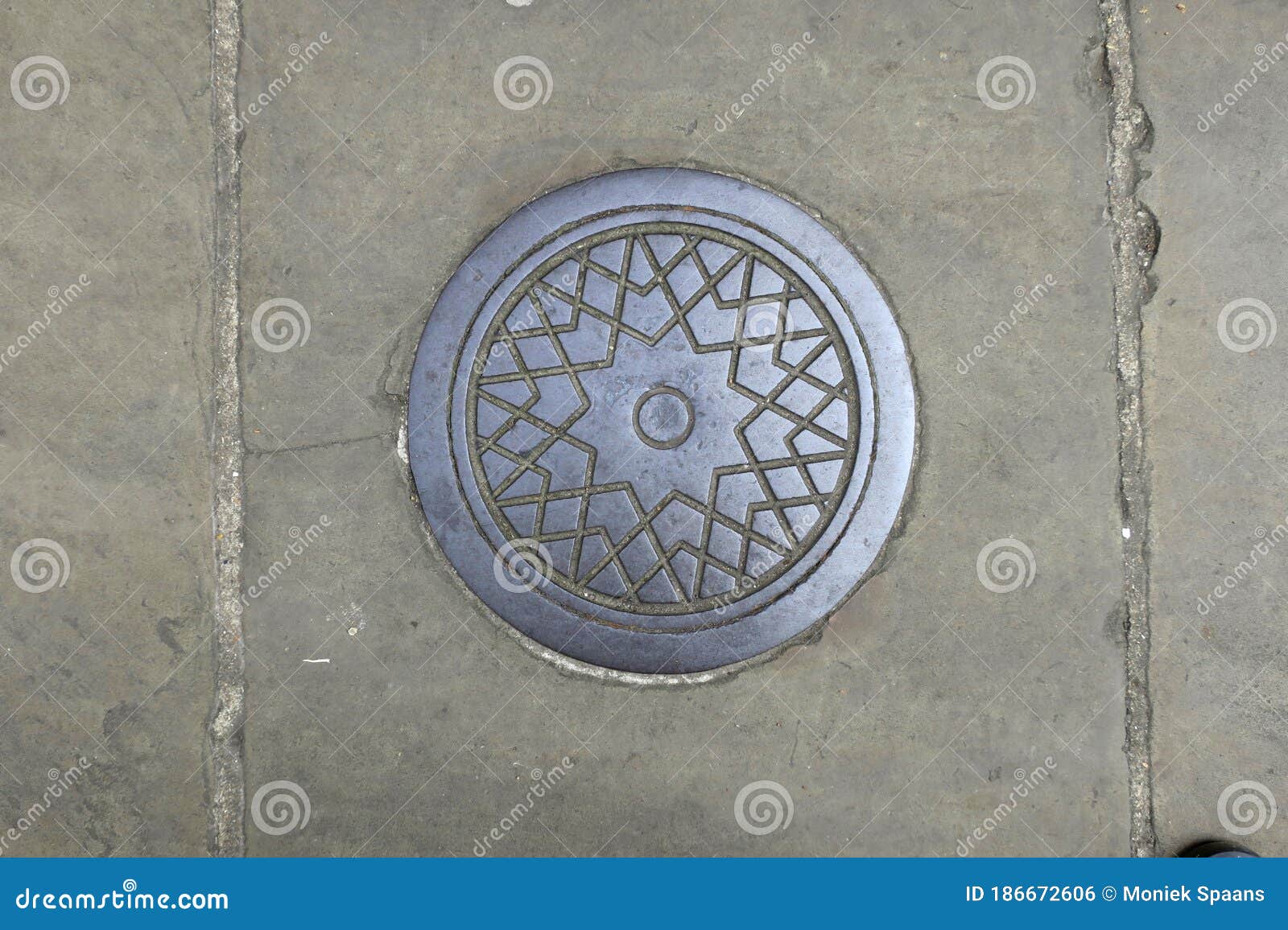 A Round Manhole And Lattice Of A Drainage Paving System. Stock Image ...