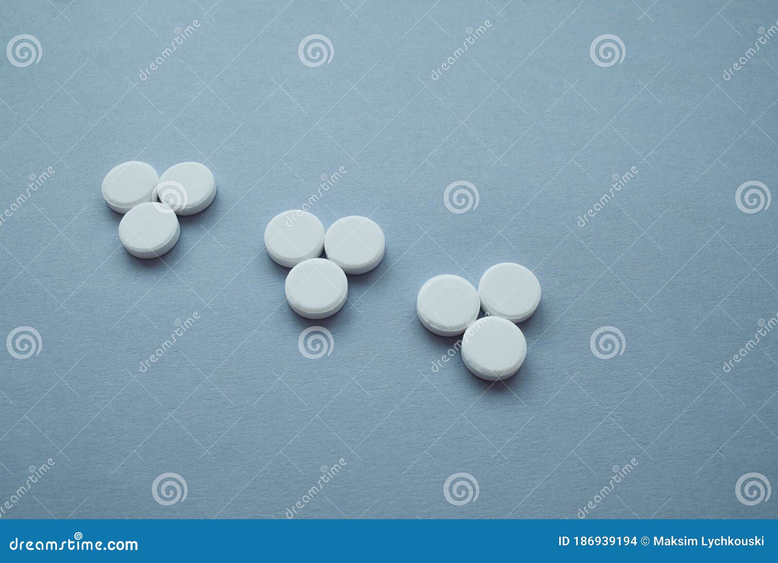 Round Medicinal Pills in Form of Three Triangles Stock Photo - Image of ...