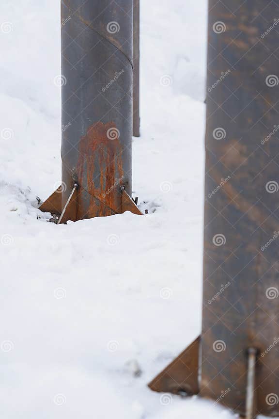 Round Metal Column Support on the Construction Site in Winter ...
