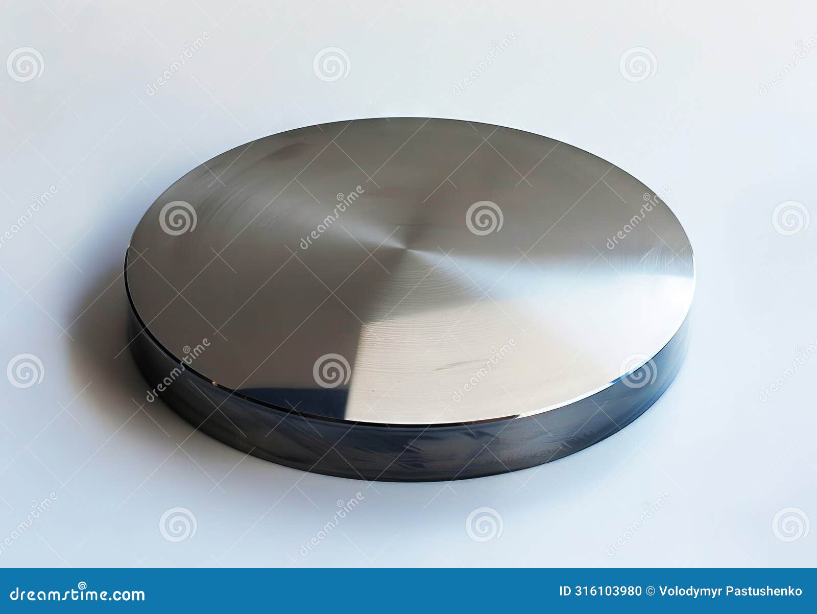 A Round Metal Plate on a White Surface Stock Photo - Image of plate ...