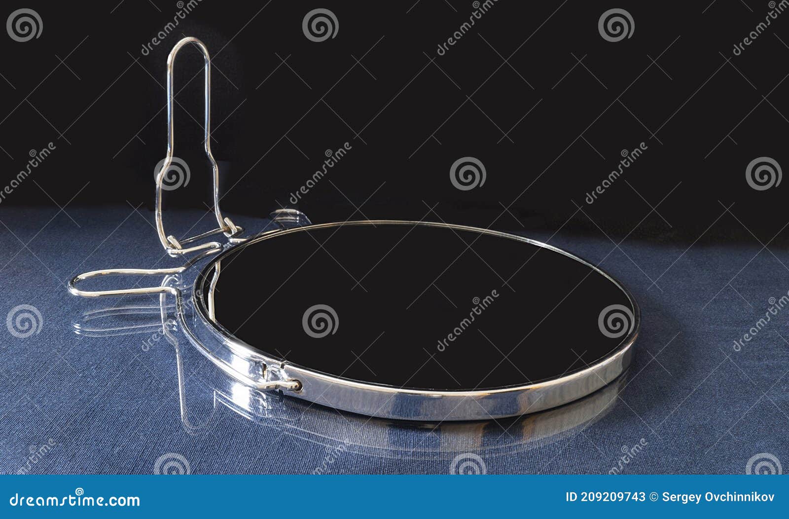 Round Mirror on Glass Table with Reflection Stock Image - Image of ...