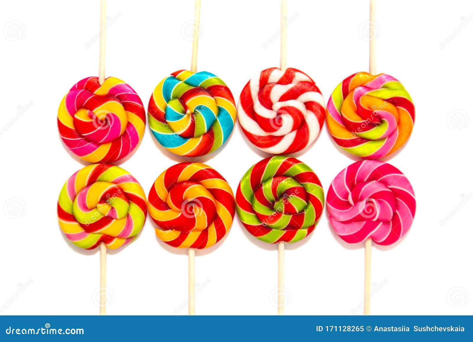 Round Multi-colored Lollipops on a Wooden Stick Stock Image - Image of ...
