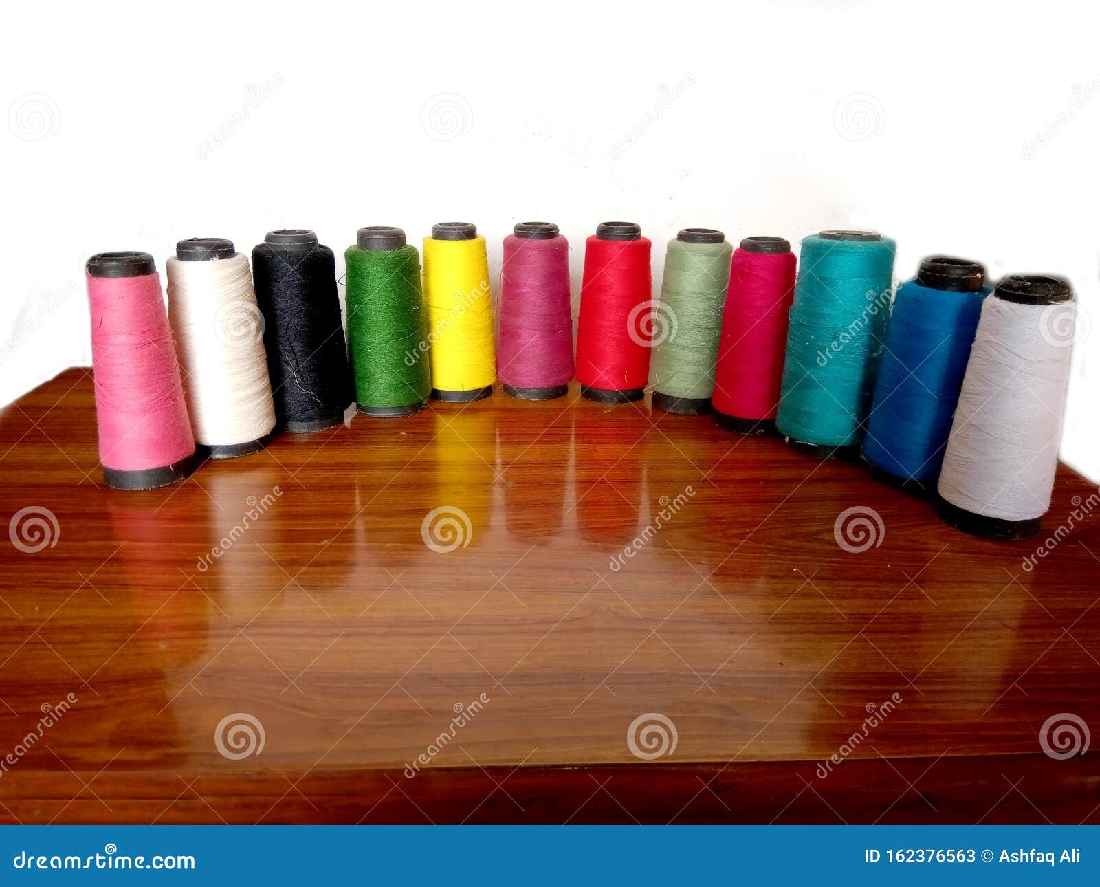 Sewing Threads, Stitching Threads, Tailoring Threads on Table Stock ...