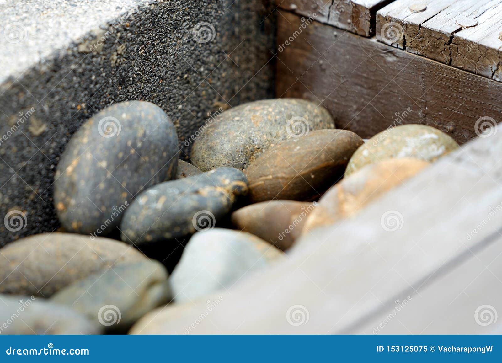 Round and Oval Shape Stones with Concrete Wall Corner Stock Image ...