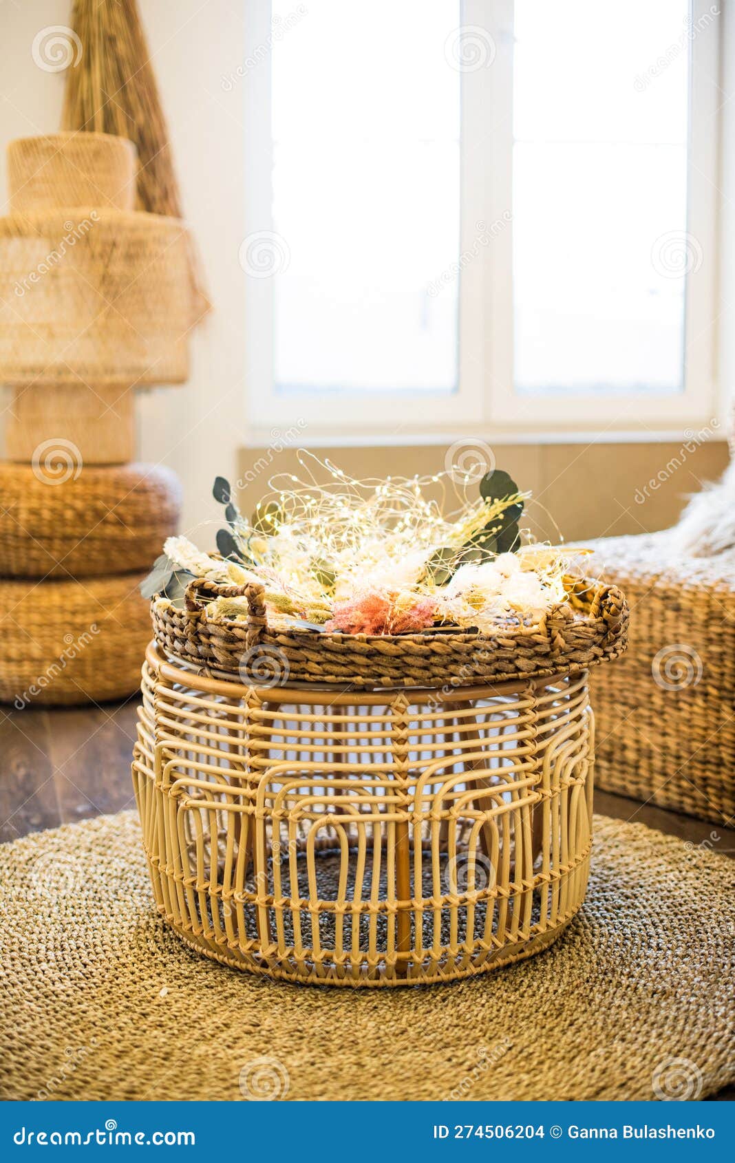 A Round Rattan Table on a Round Rug Opposite the Window. Stock Photo ...