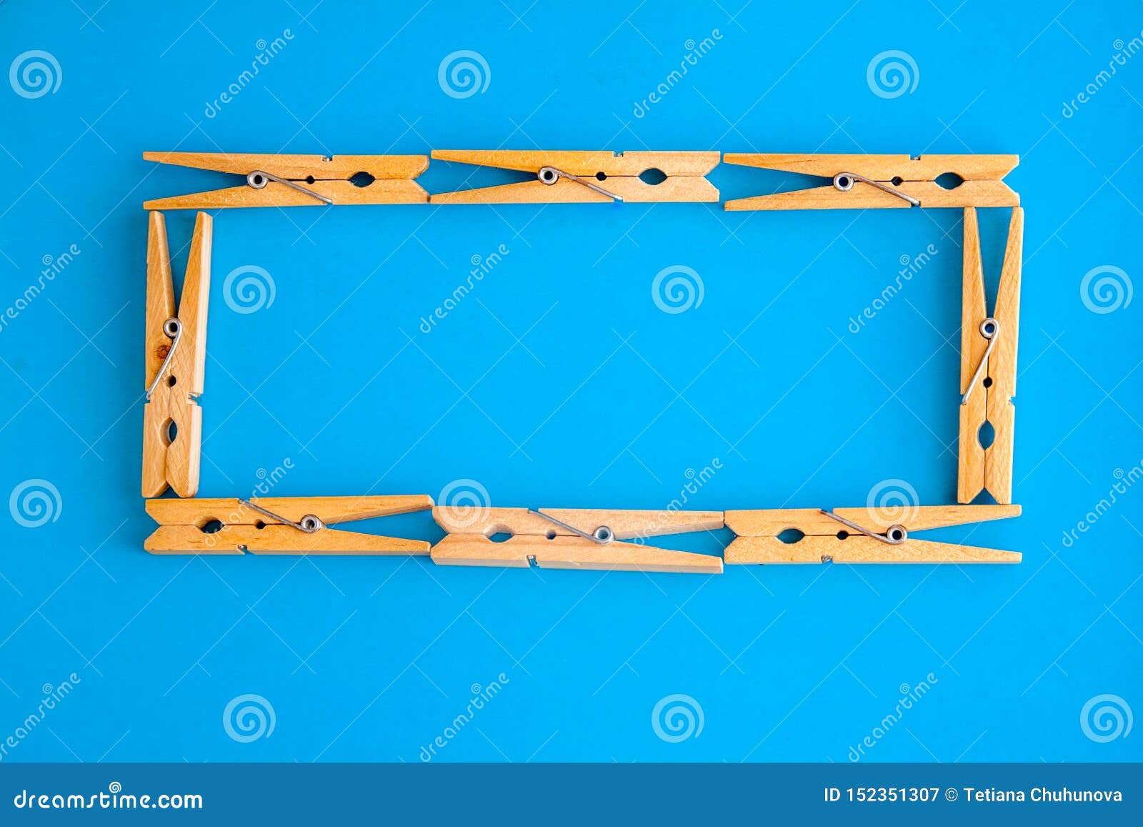 Round or Rectangular Frame Made of Wooden Clothespins on the Blue ...