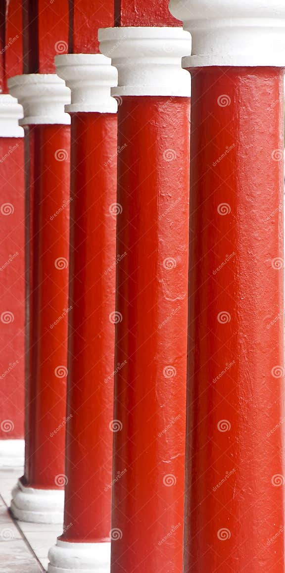 Round Red Columns with White Trim Stock Image - Image of column ...