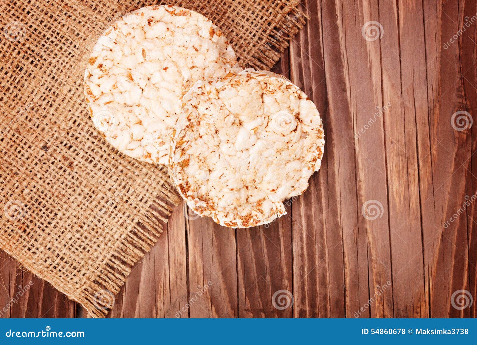 Round Rice Cakes on Wooden Table Stock Photo - Image of cakes ...