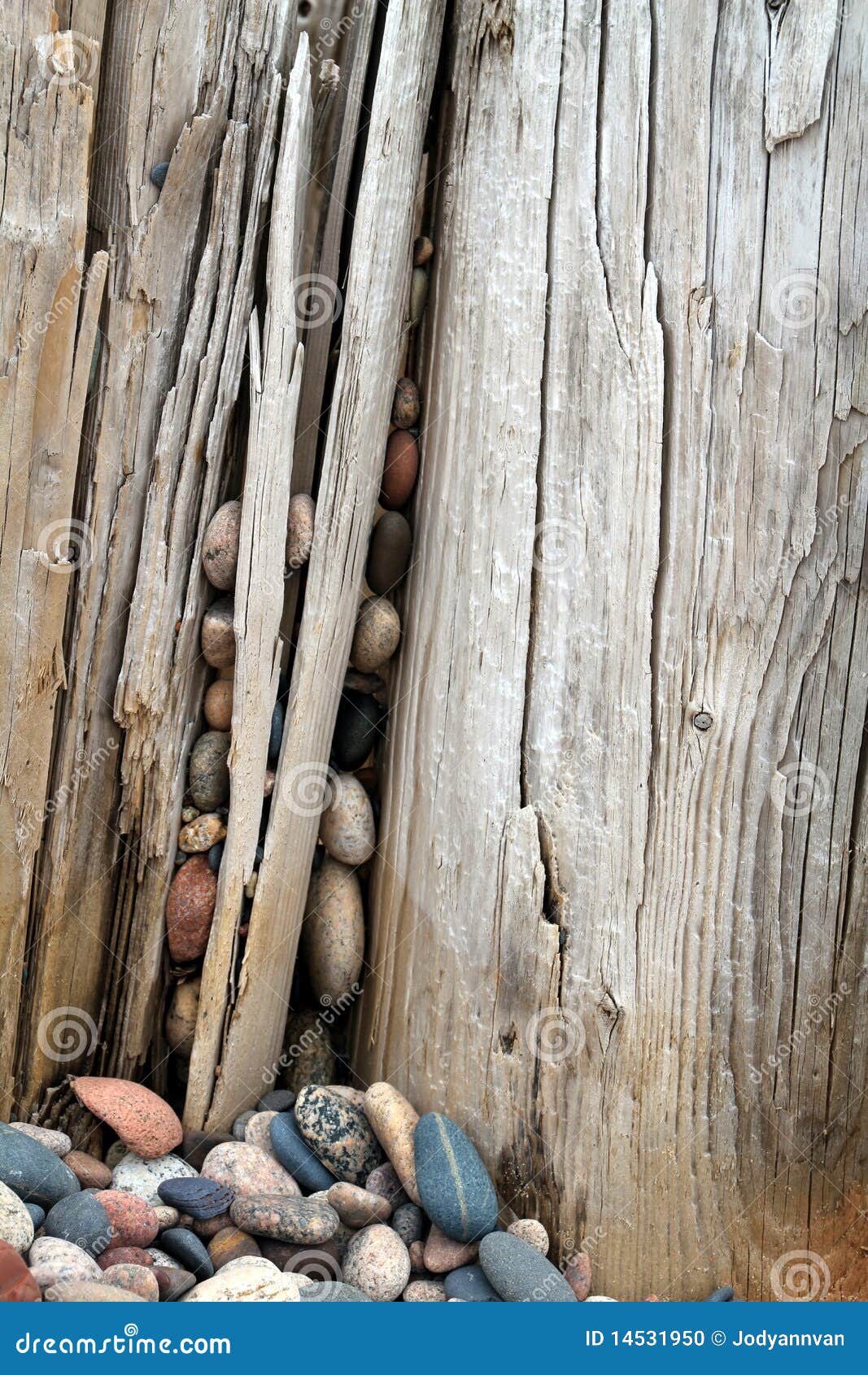 Round rocks and aged wood stock photo. Image of round - 14531950