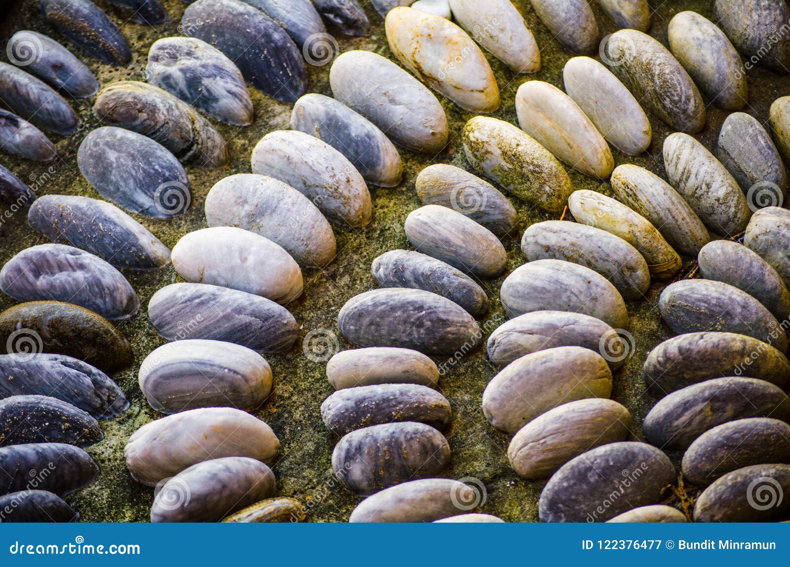 Round Rocks Arrangement on Cement Surface Texture for Decoration. Stock ...