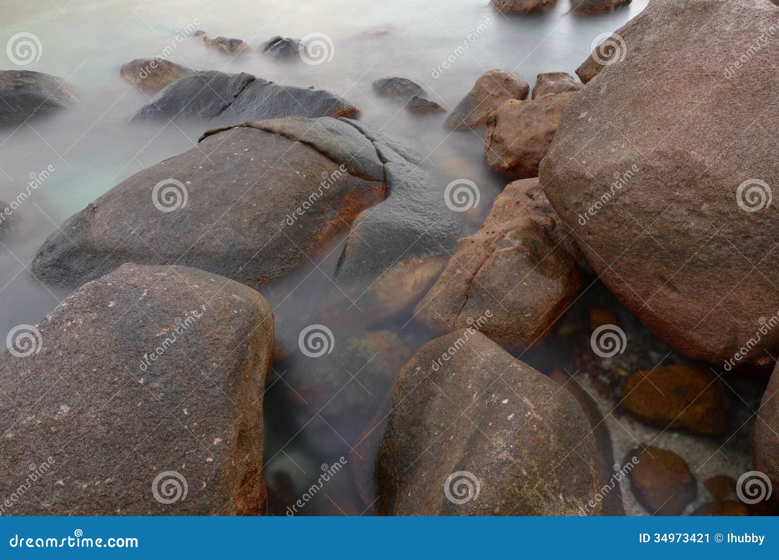 Round Rocks Stones Used In Natural Looking Facade Wall Or Ground ...