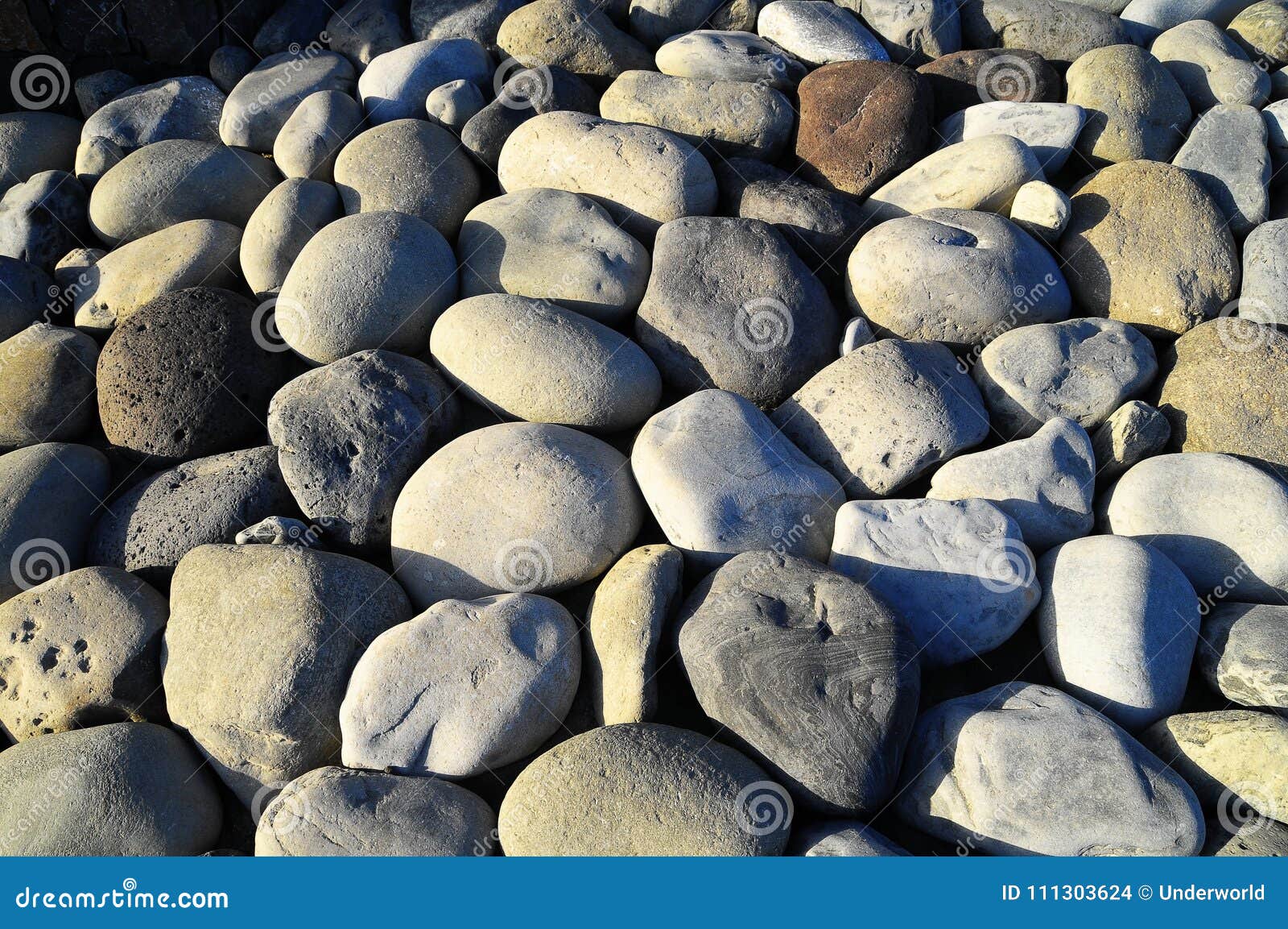 Round Rocks Smoothed by the Water Stock Photo - Image of natural, hard ...