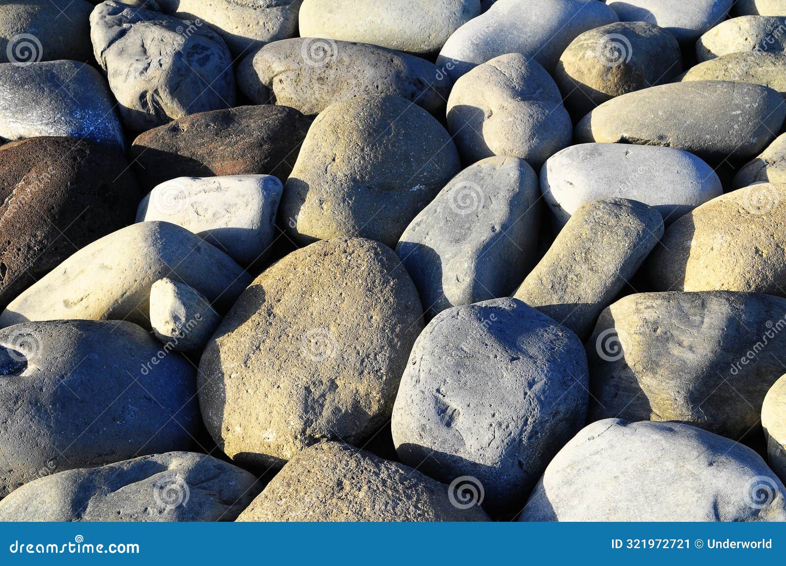 Round Rocks Smoothed by the Water Stock Image - Image of surface, stone ...