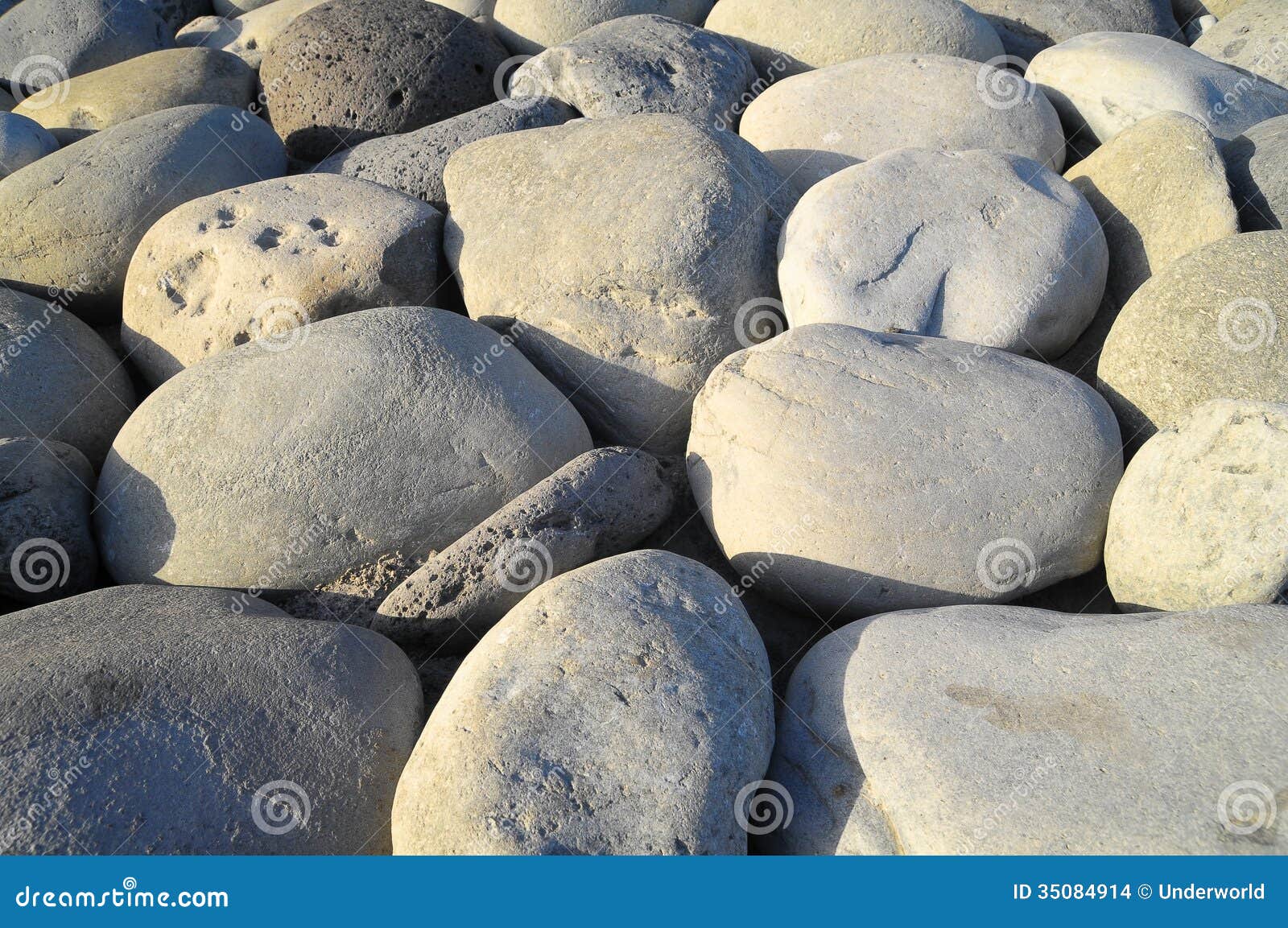 Round Rocks Smoothed by the Water Stock Photo - Image of material ...