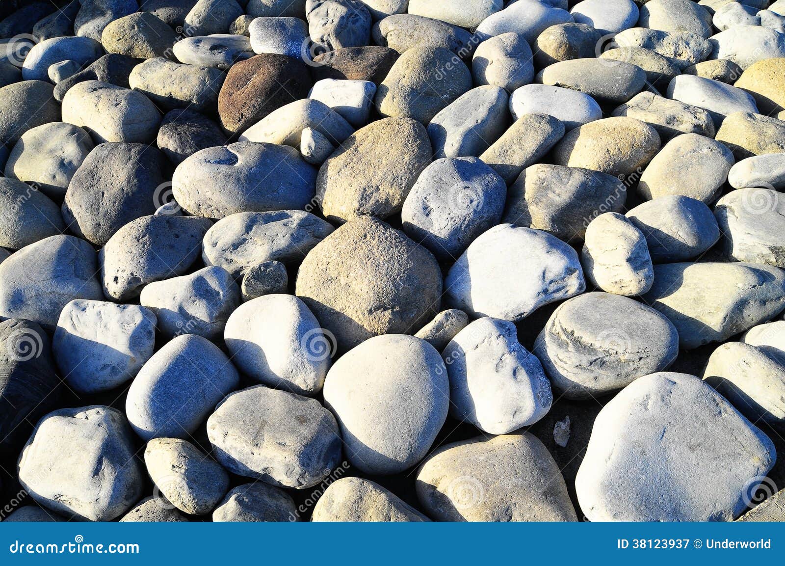 Round Rocks Smoothed by the Water Stock Image - Image of stone ...