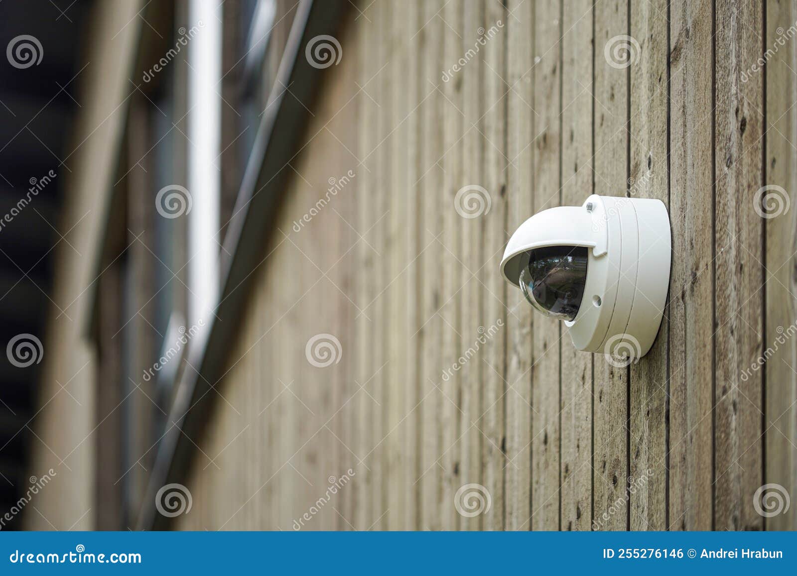 Round Shaped Weathersealed Security Camera on the Wooden Wall Stock ...